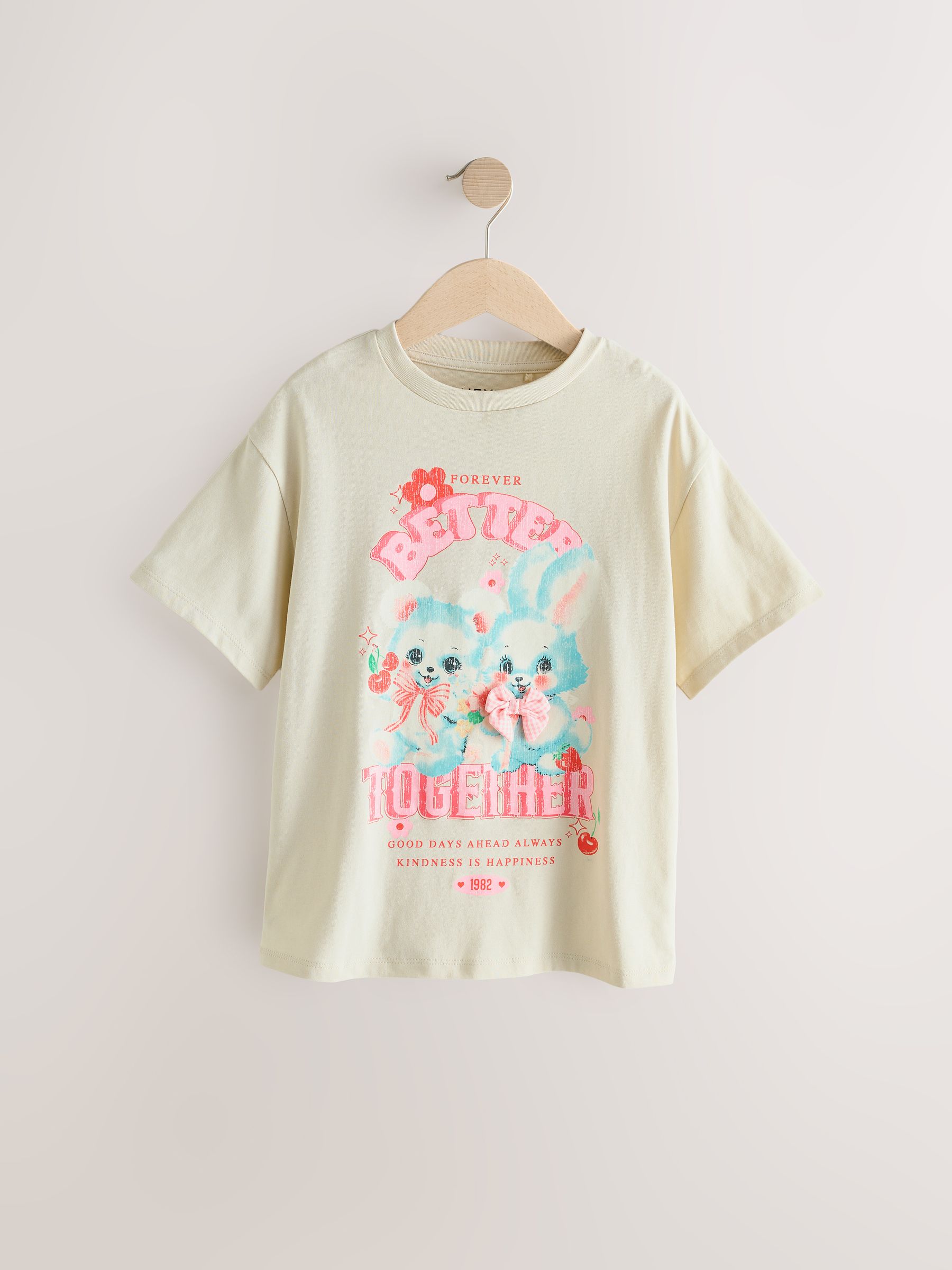Buy Cream Oversized Graphic Print T-Shirt (3-16yrs) from the Next UK ...