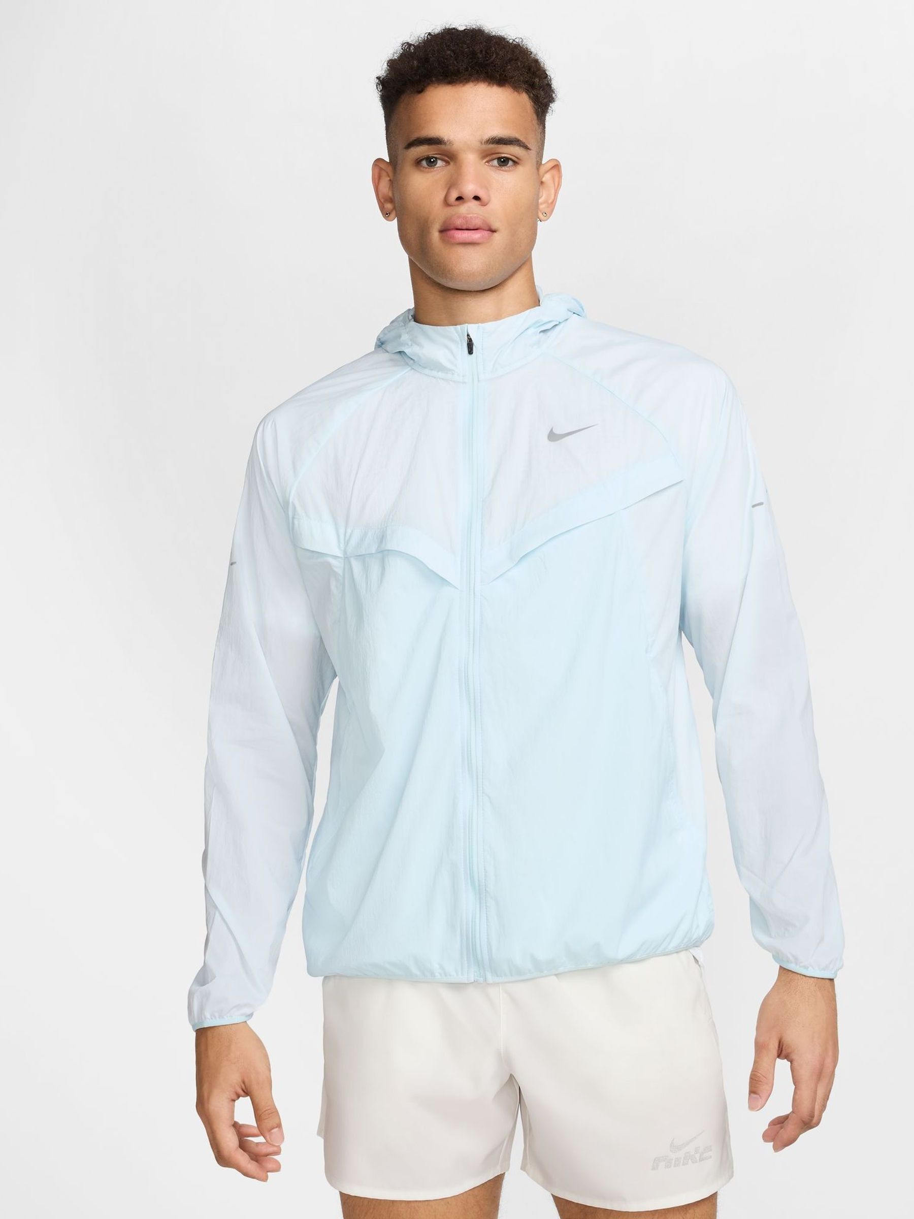 Buy Nike Glacier Blue Dri-FIT Stride Woven Running Jacket from the Next ...