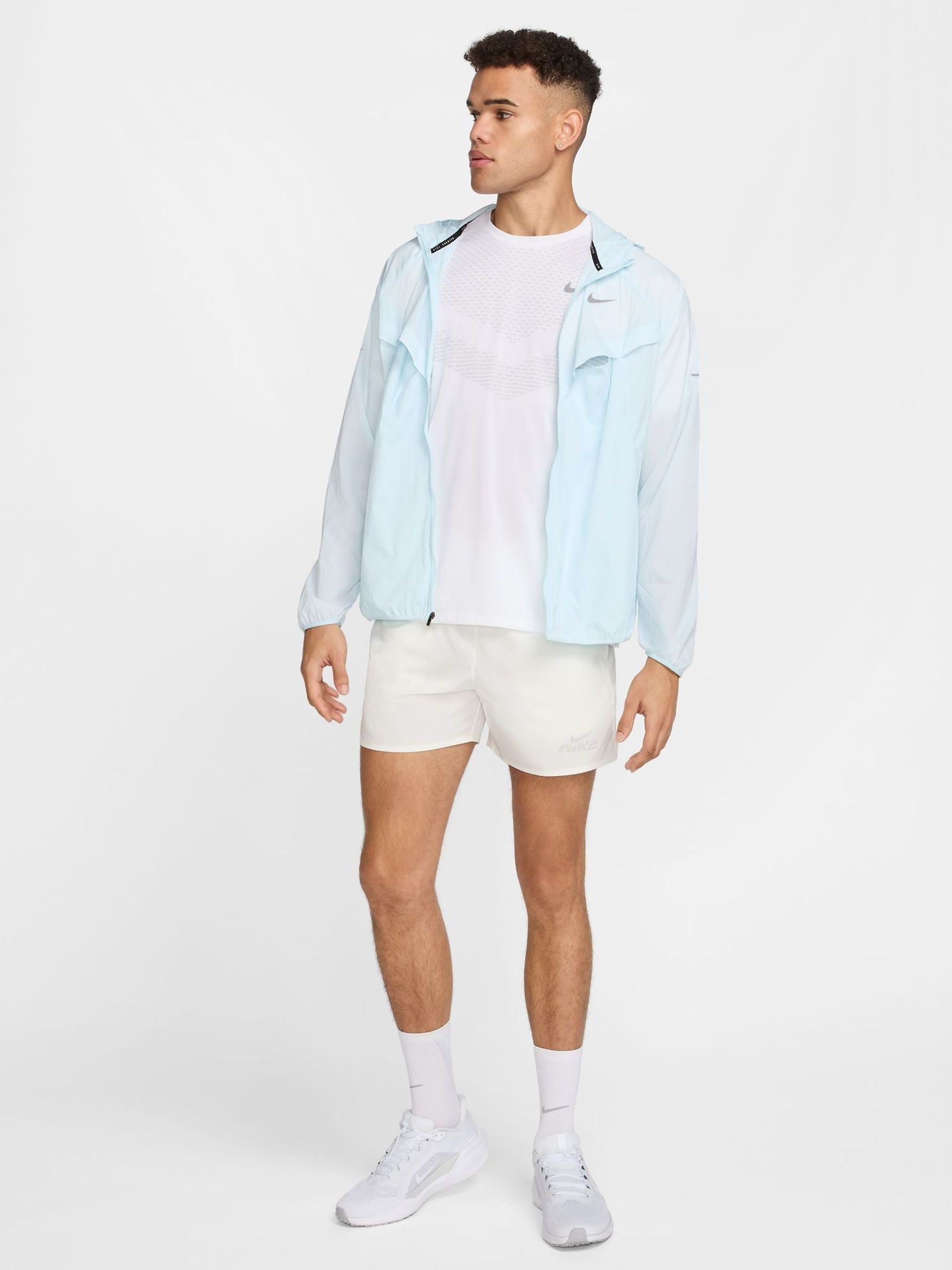 Buy Nike Glacier Blue Dri-FIT Stride Woven Running Jacket from the Next ...