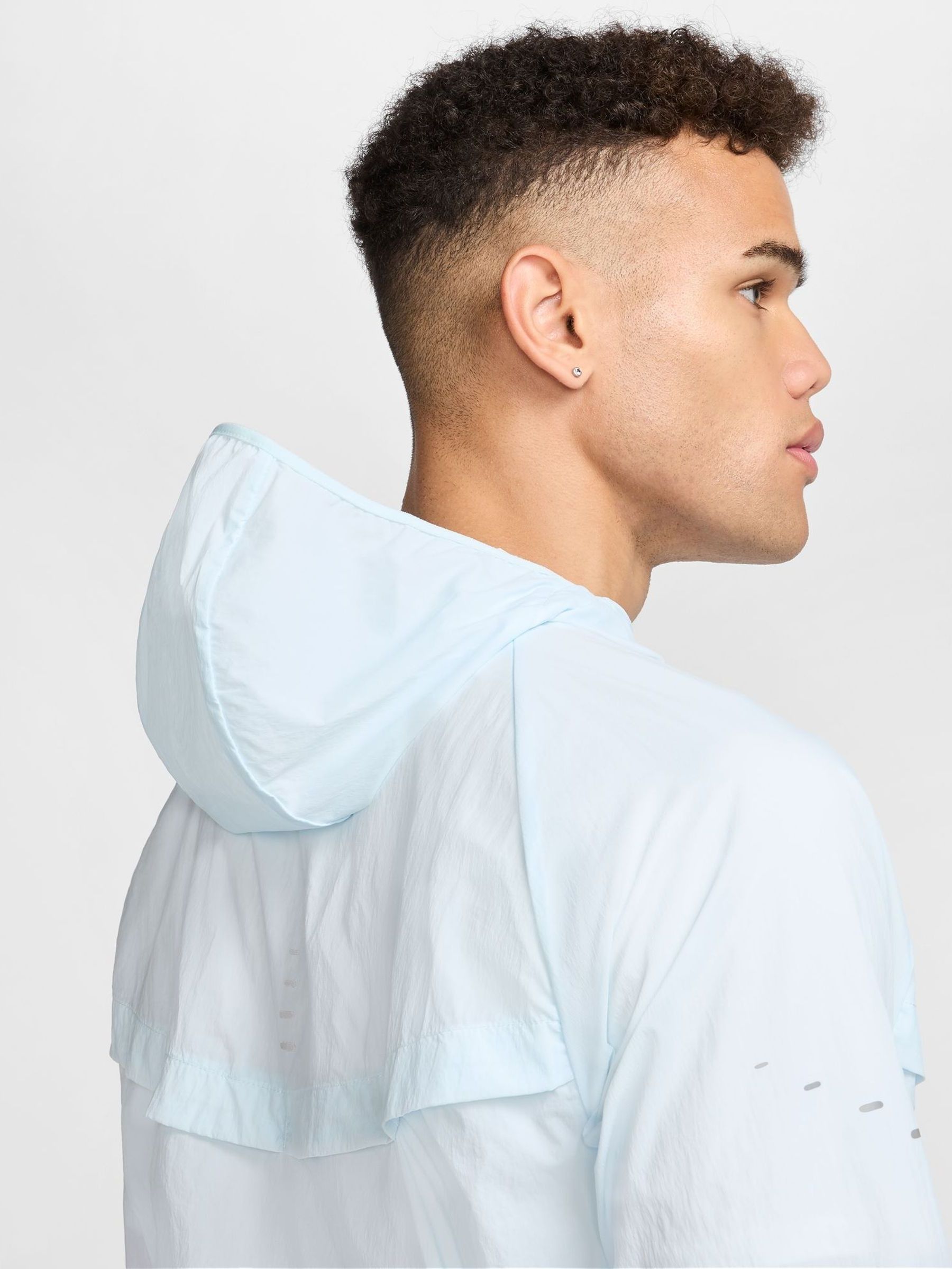 Buy Nike Glacier Blue Dri-FIT Stride Woven Running Jacket from the Next ...