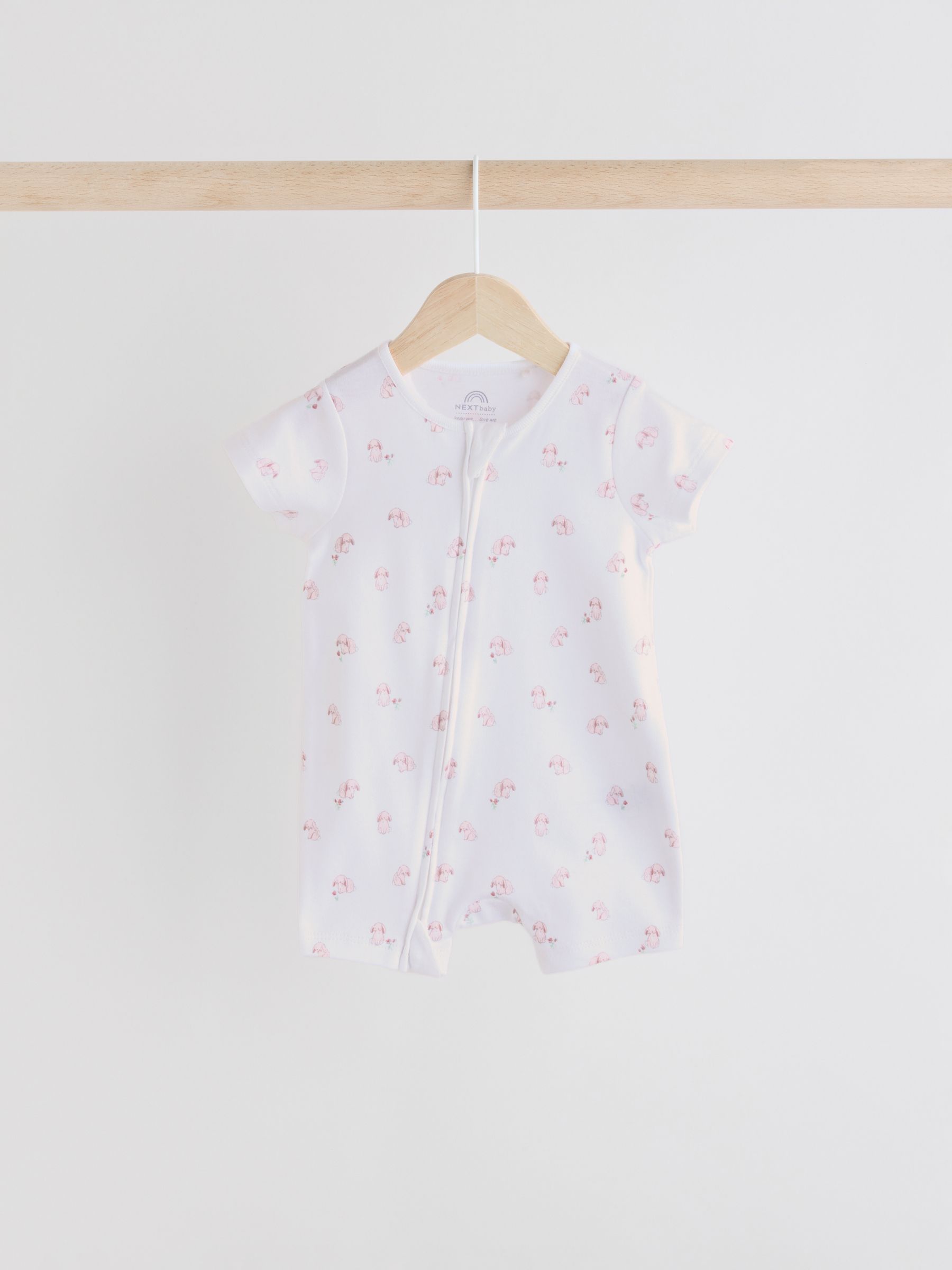 Buy Pink 3 Pack Two Way Zip Baby Rompers (0mths-3yrs) from the Next UK ...