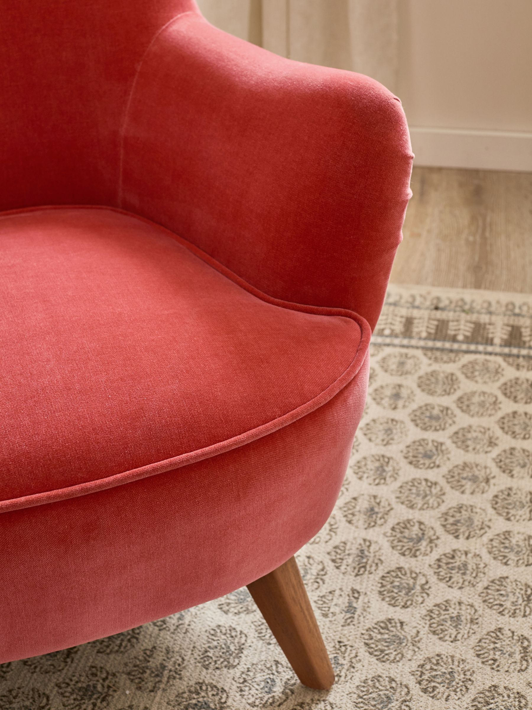 Buy Opulent Chenille Coral Pink Larson Highback Armchair from the Next ...
