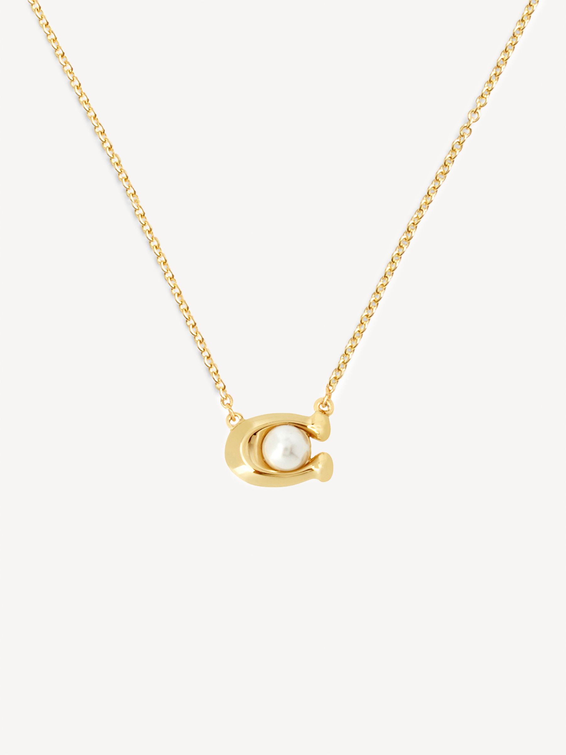Buy COACH Gold Tone Signature Pearl Jewellery Set from the Next UK ...