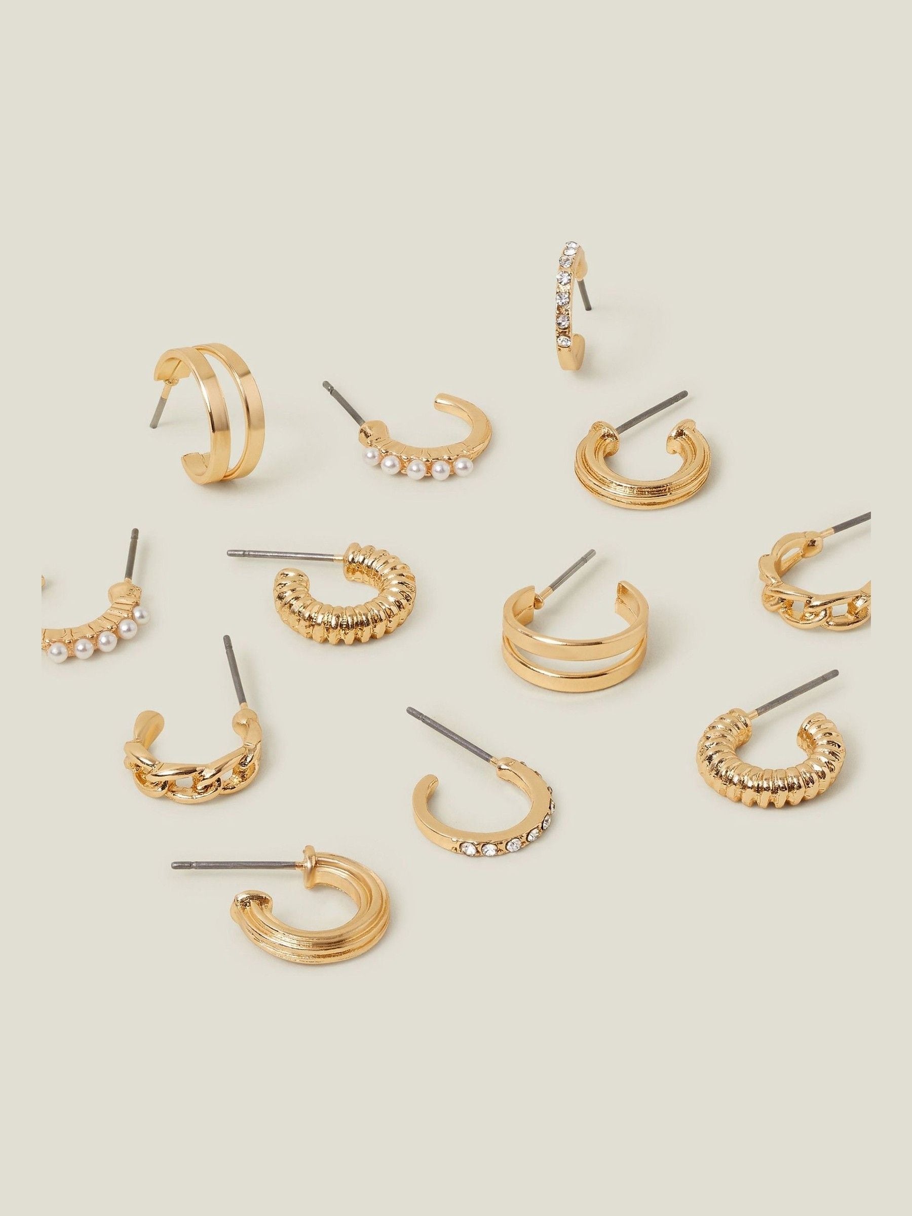 Buy Accessorize Gold Tone Textured Hoops Earrings 6 Pack from the Next ...