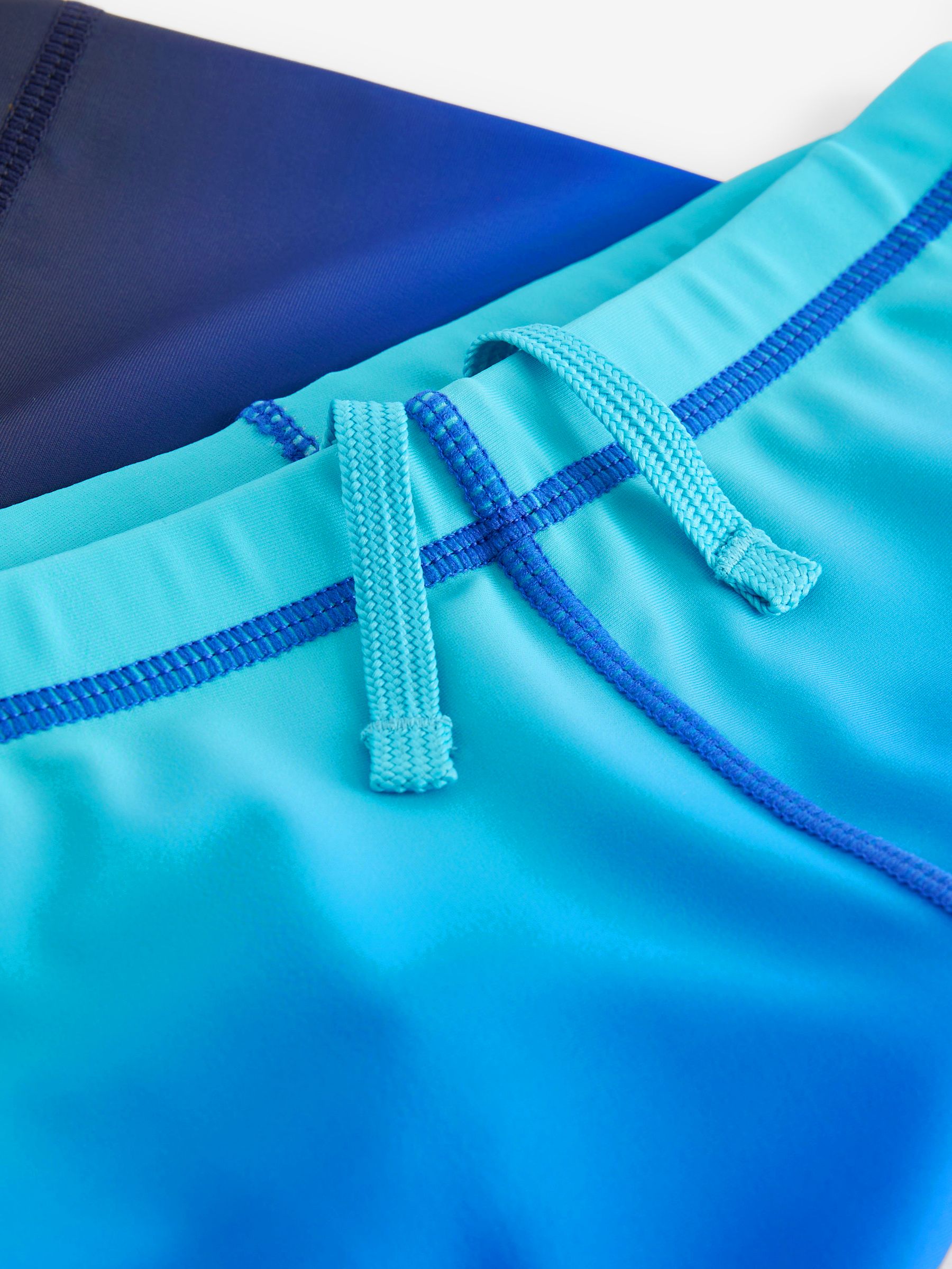 Buy Blue Ombre Longer Length Stretch Swim Shorts (3-16yrs) from Next Israel