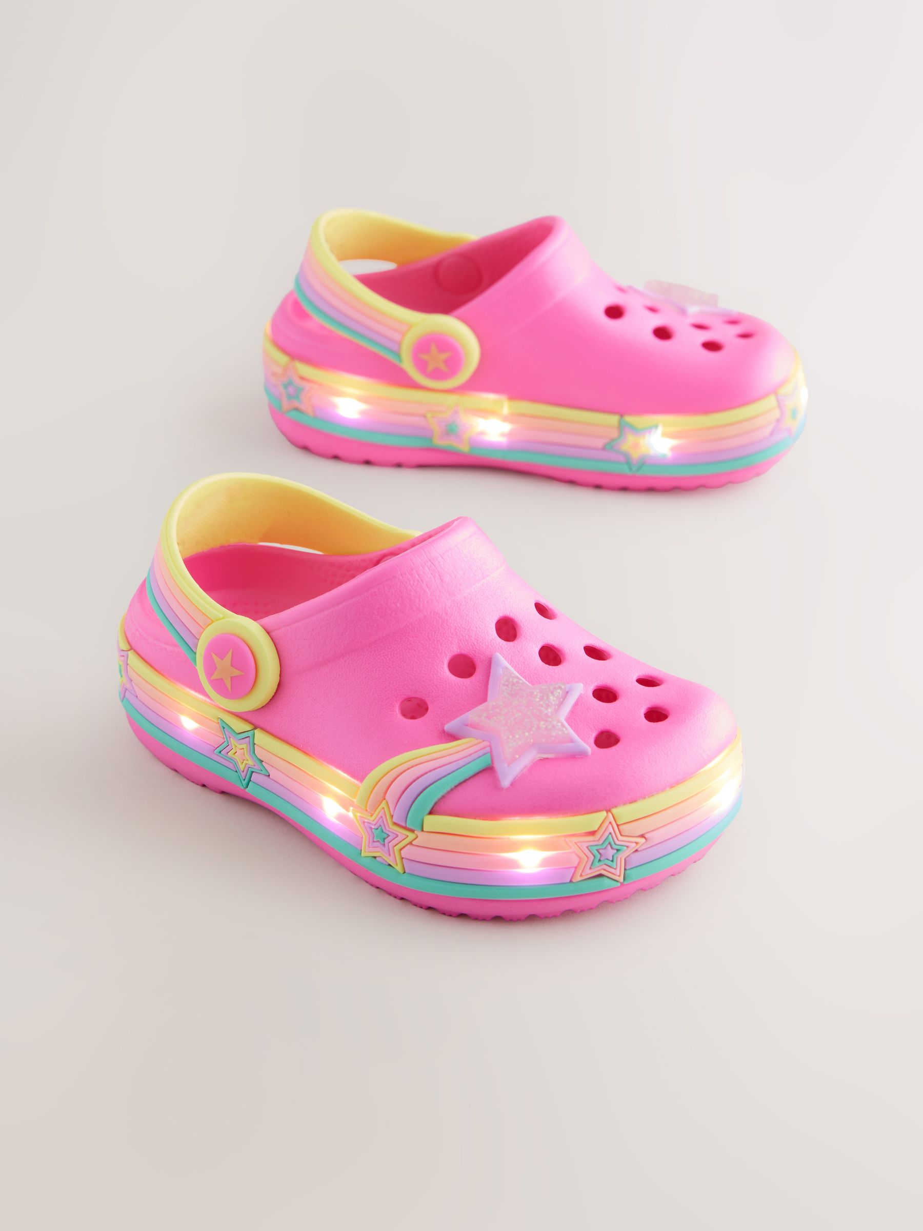 Buy Bright Pink Star Light Up Clogs from the Next UK online shop