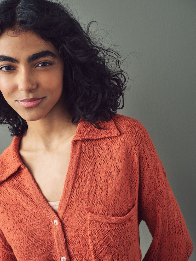 next orange button jumper