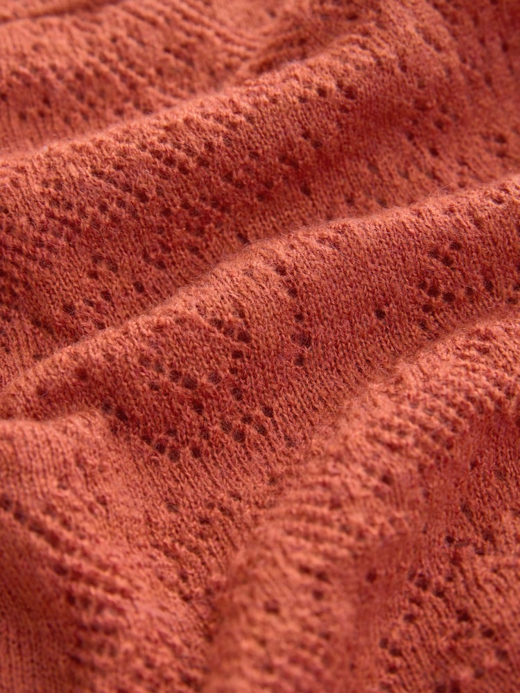 next orange button jumper