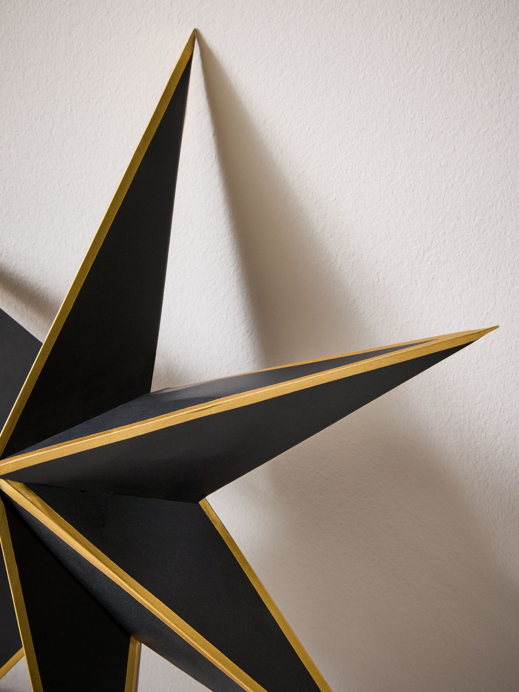 Buy Set of 2 Black Paper Star Christmas Decorations from the Next UK ...