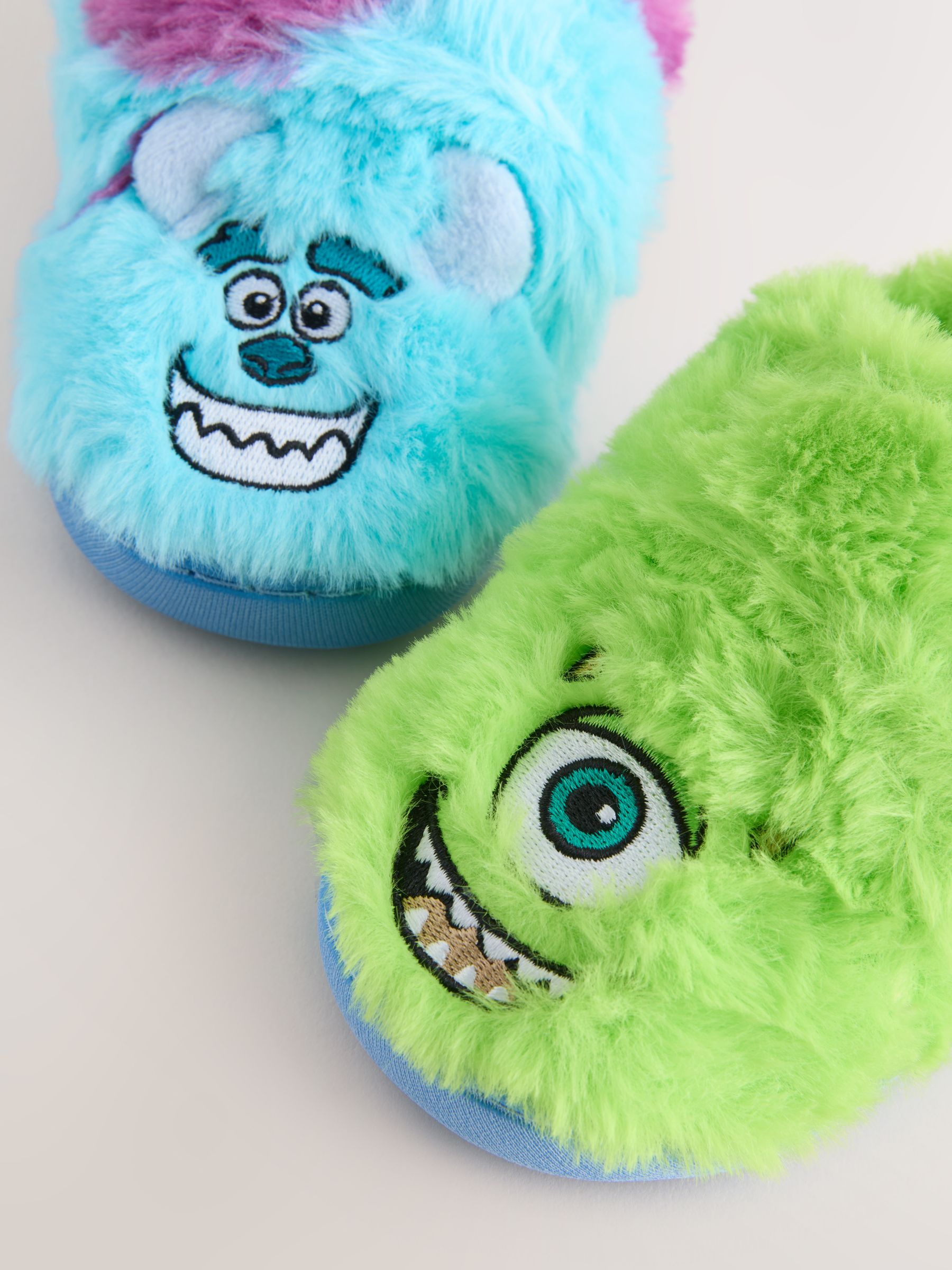 Buy Blue/Green Monsters Inc Fluffy Cupsole Slippers from Next Ireland