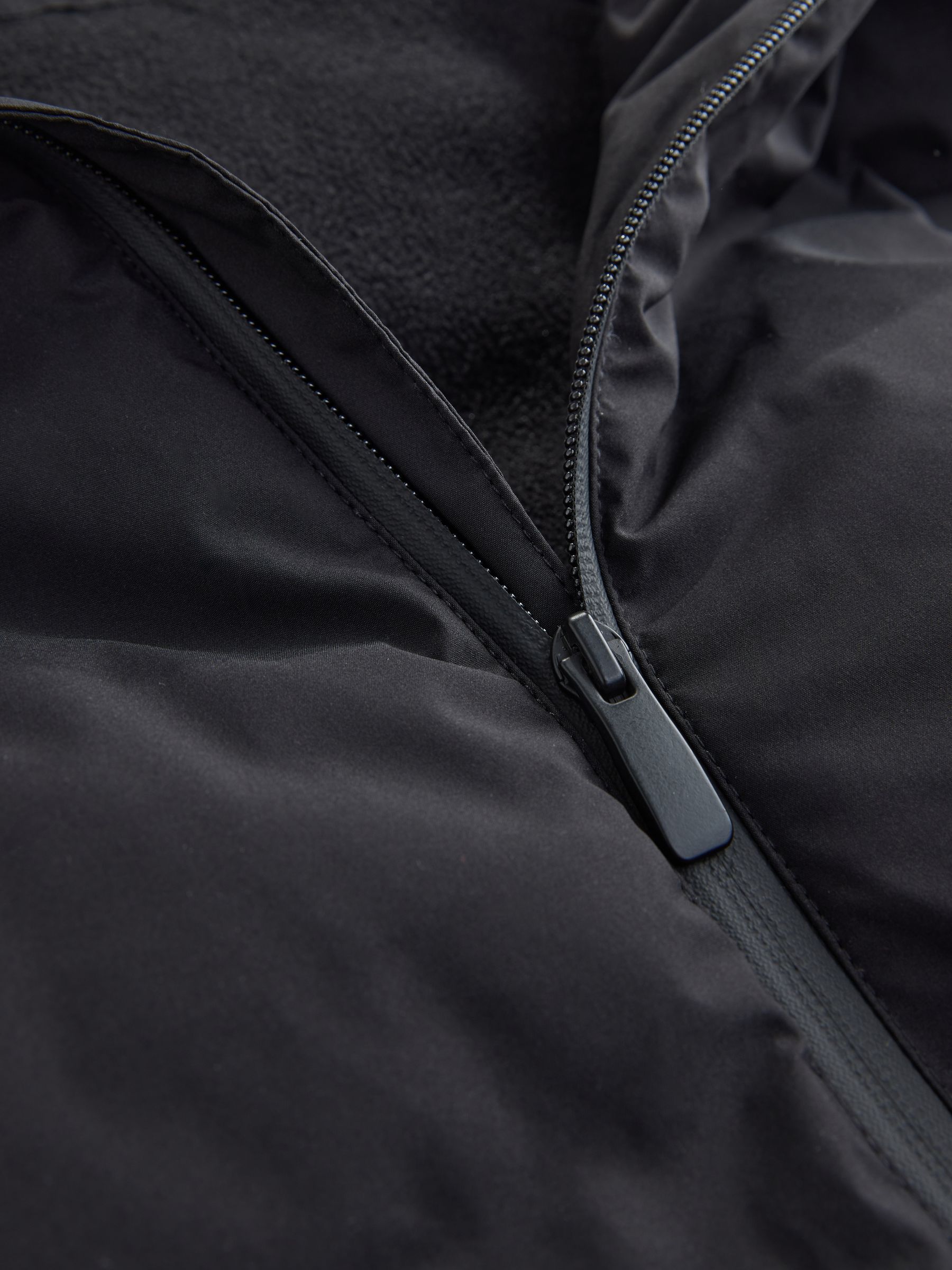 Buy Black ThermoGen Shower Resistant Puffer Jacket from the Next UK ...