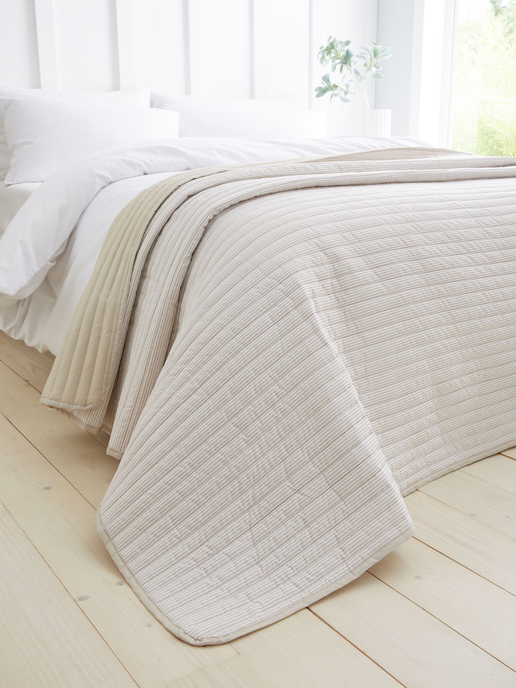 Buy Catherine Lansfield Natural Stripe Quilted Reversible Bedspread ...