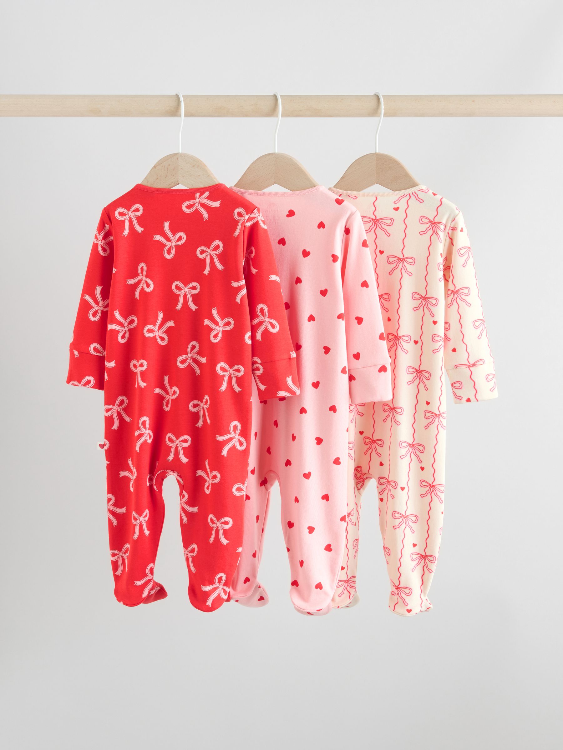 Buy Red Bow Two Way Zip Sleepsuits 3 Pack (0mths-2yrs) from Next Saudi ...