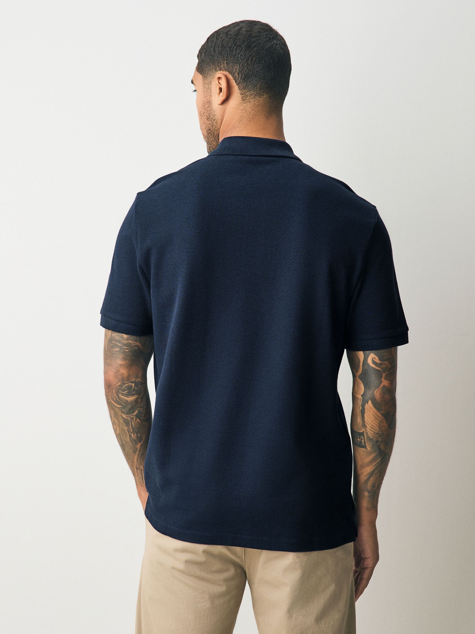 Buy Navy Blue Regular Fit Textured Smart Polo Shirts from the Next UK ...