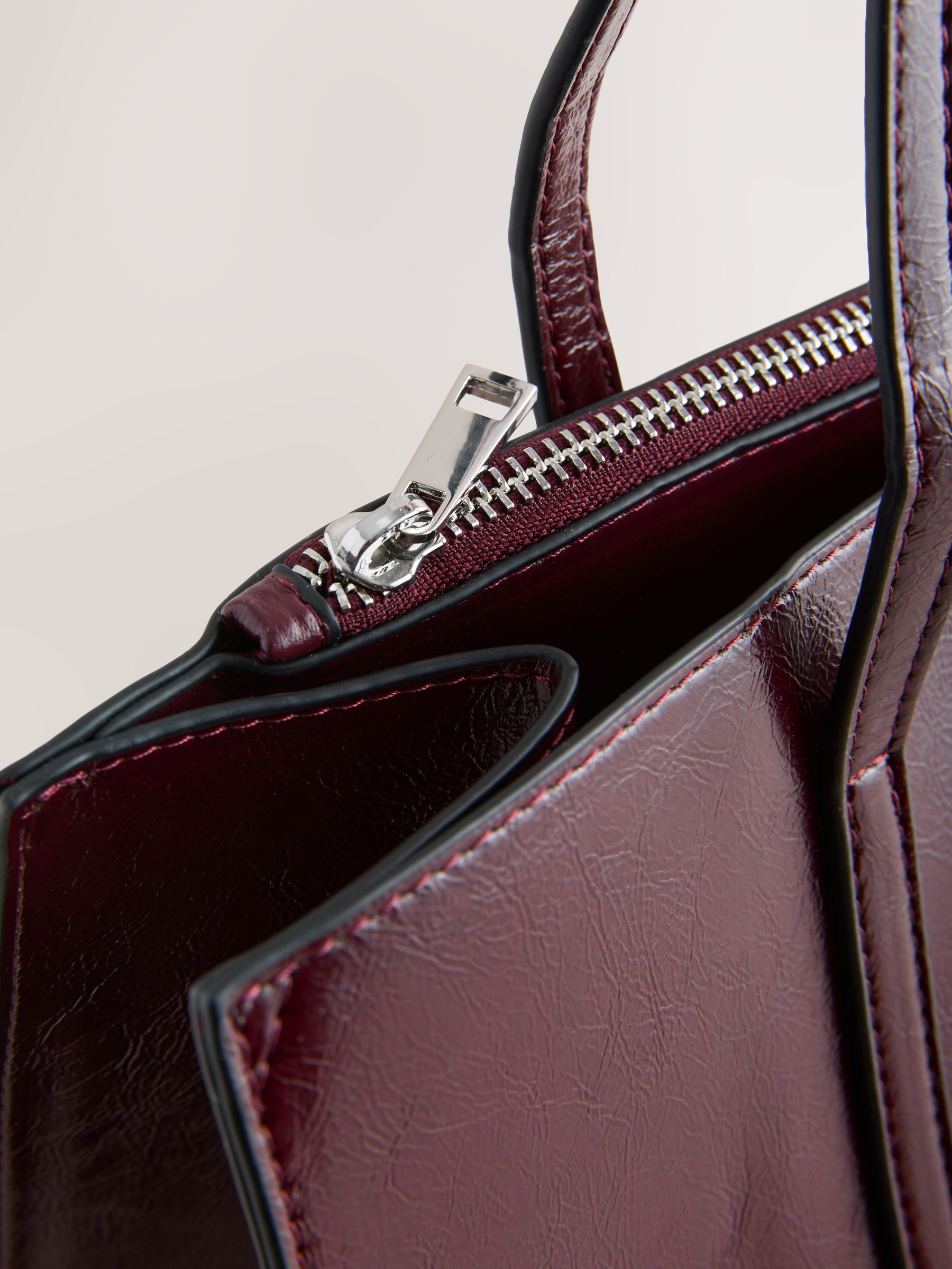 Buy Burgundy Gloss Structured Tote Bag from Next Jordan