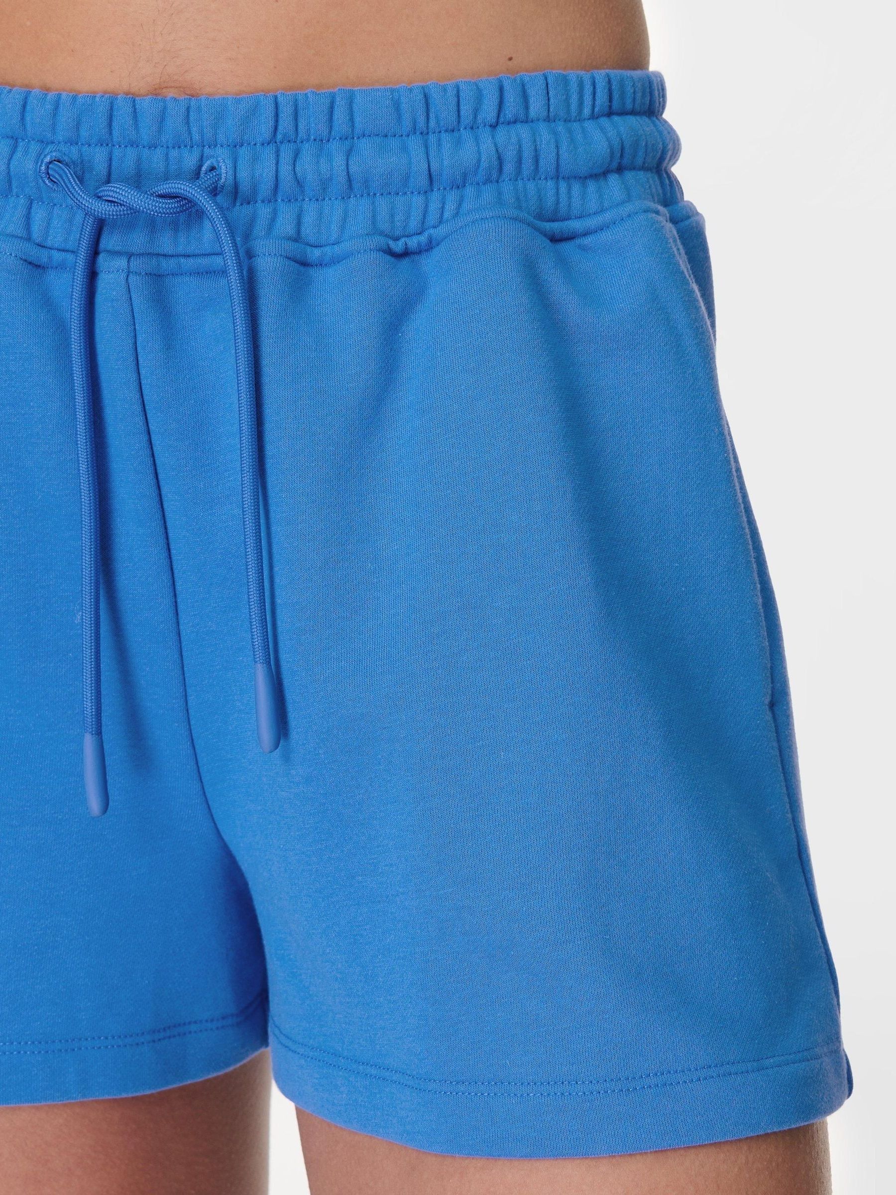 Buy Sweaty Betty Blue Revive Boxy Shorts from the Next UK online shop