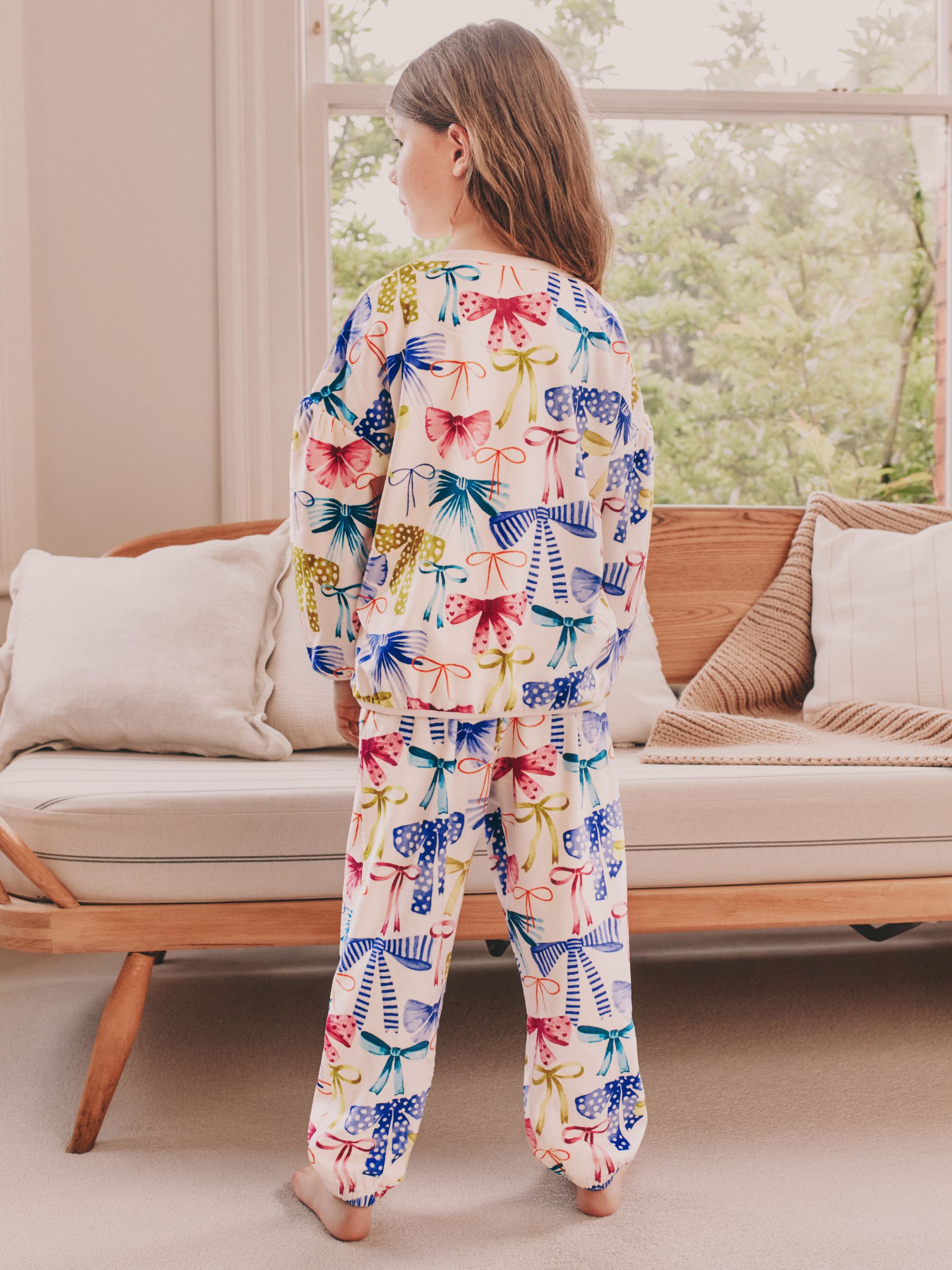 Buy Multi Bow Print Cosy Fleece Pyjamas (9mths-16yrs) from Next Ireland