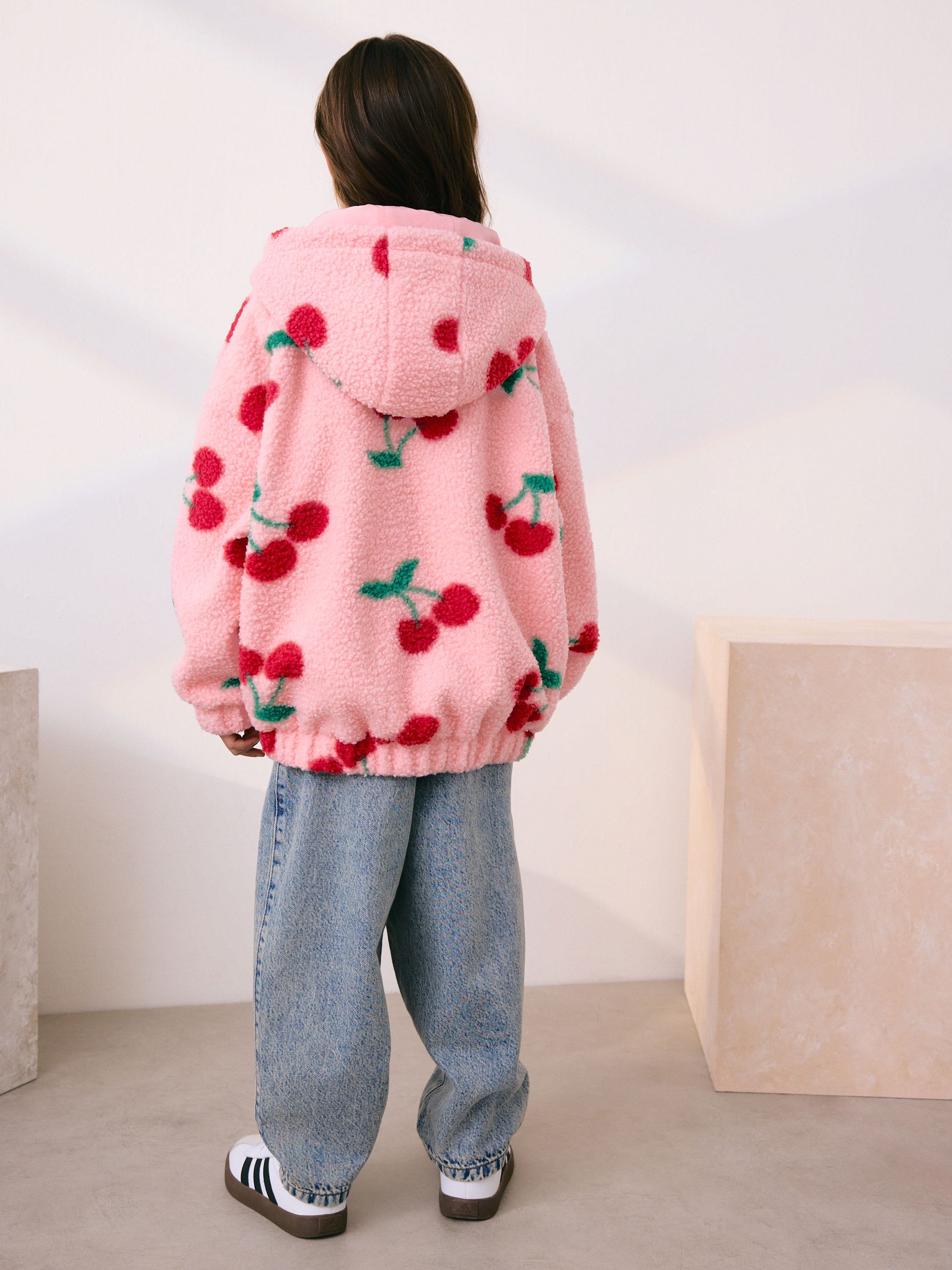 Buy Pink/Red Cherry Hooded Zip Borg Fleece Jacket (3-16yrs) from Next ...