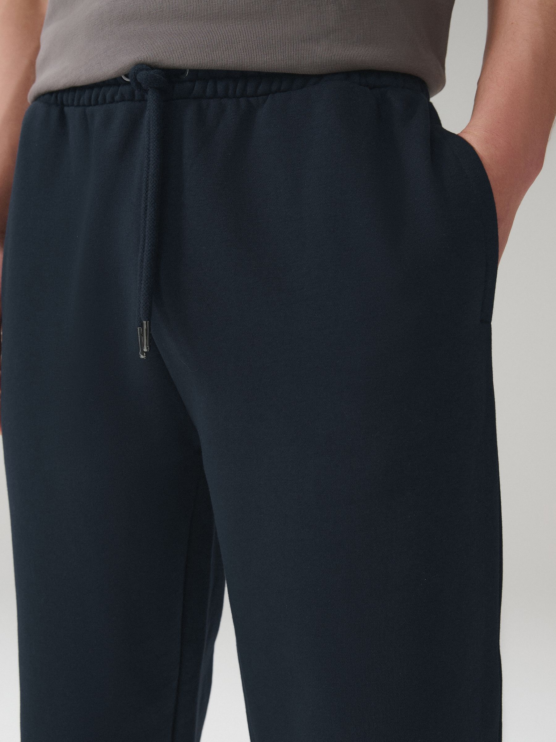 Buy Navy Blue Straight Fit Brushback Joggers from the Next UK online shop
