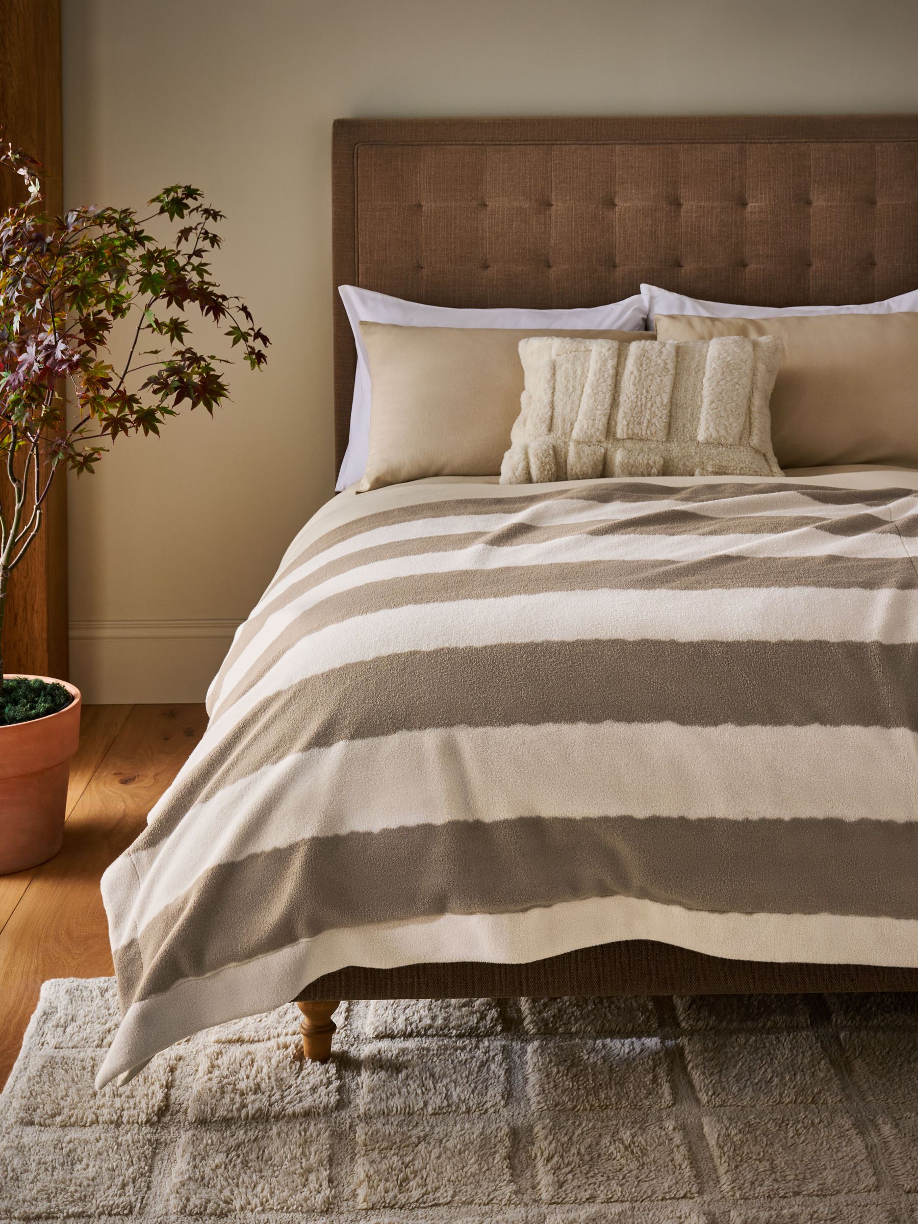 Buy Natural Stripe Fleece Throw from the Next UK online shop