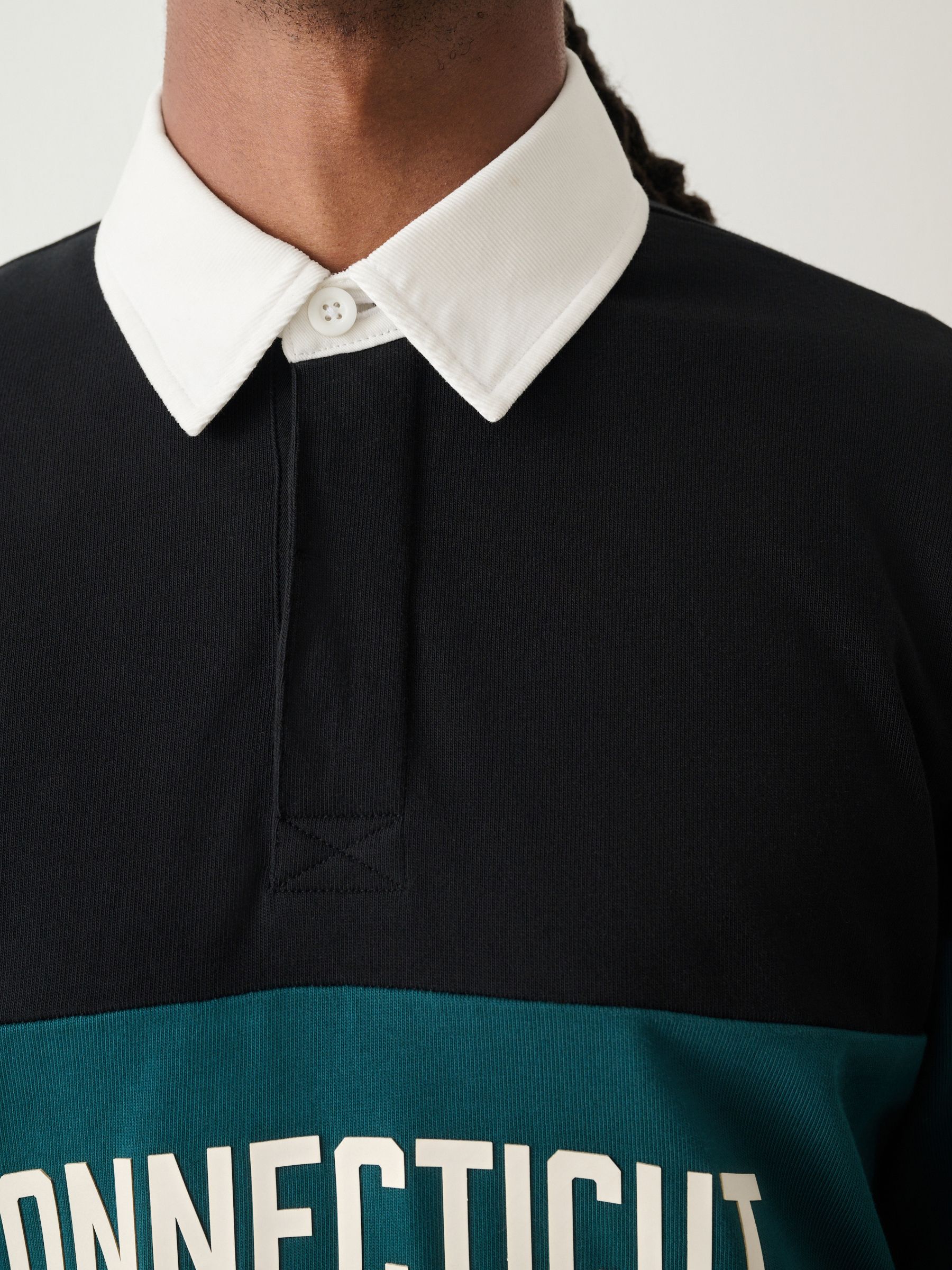 Buy Black/Teal Blue Block Rugby Shirt from Next Germany