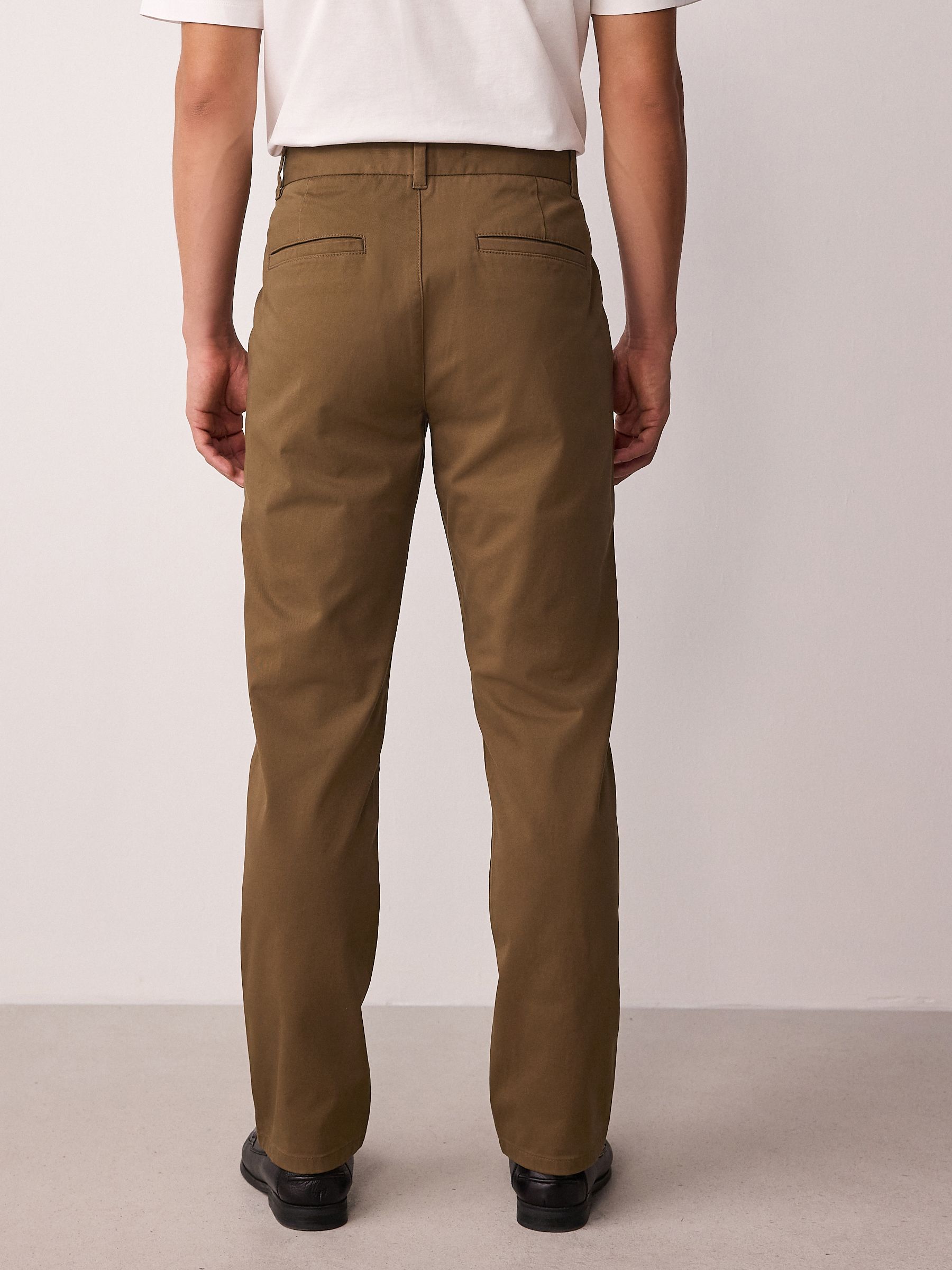 Buy Tan Brown Slim Fit Stretch Chinos Trousers from Next Ireland