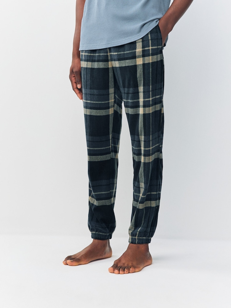 Buy Black Check Textured Cosy Motionflex Cuffed Pyjamas Set from Next ...