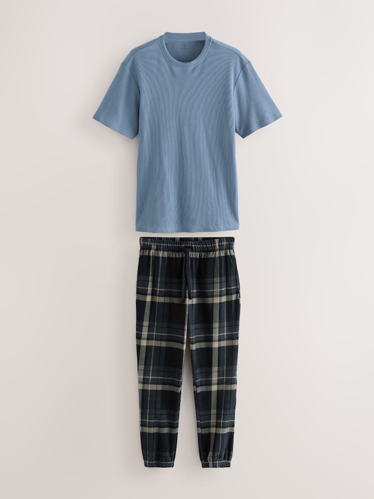 Buy Black Check Textured Cosy Motionflex Cuffed Pyjamas Set from Next ...