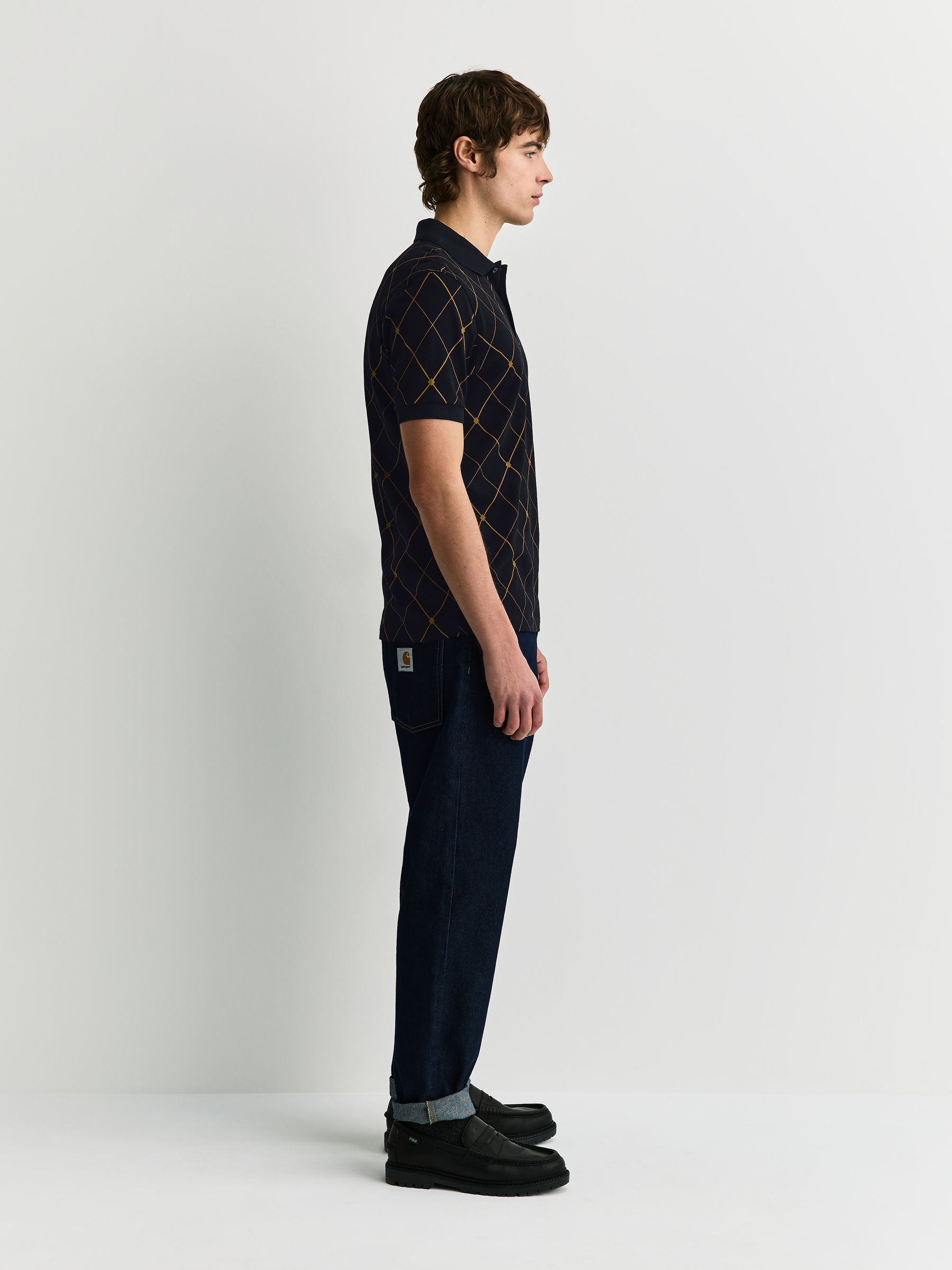 Buy Fred Perry Black Argyle Print Polo Shirt from the Next UK online shop