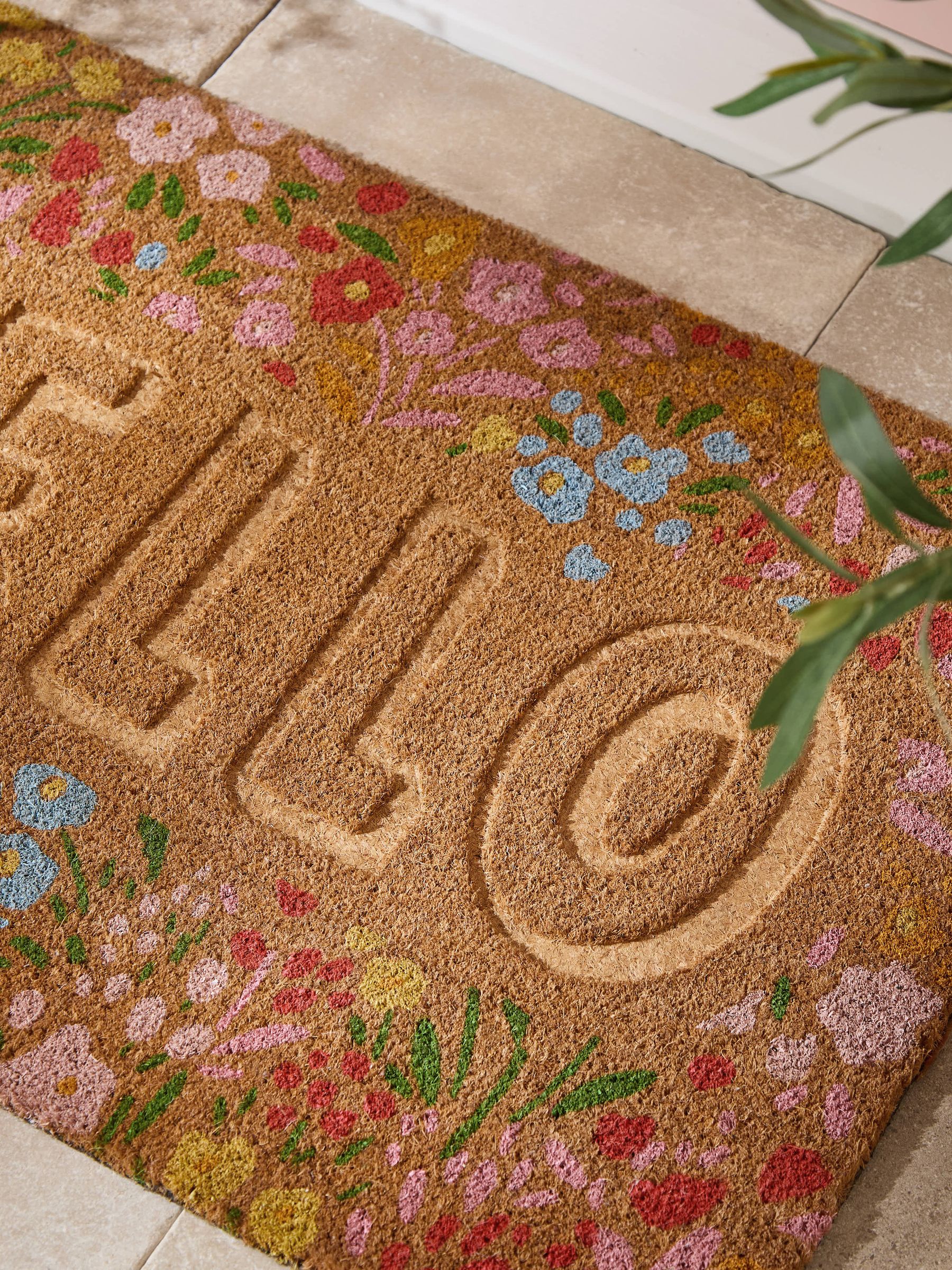 Buy Multi Floral Embossed Hello Coir Doormat from Next Netherlands