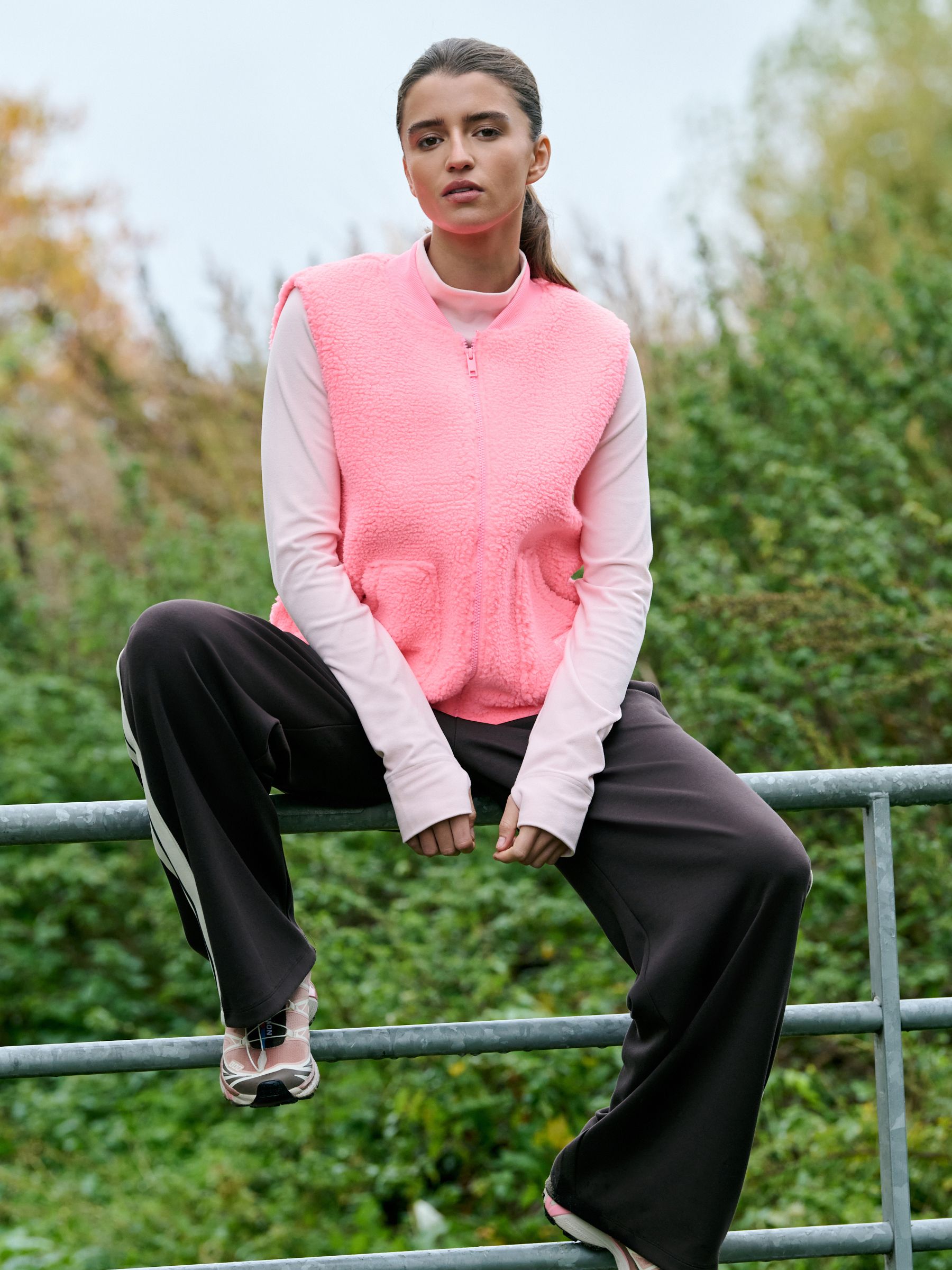 Buy Fluro Pink Borg Zip Through Gilet from Next USA