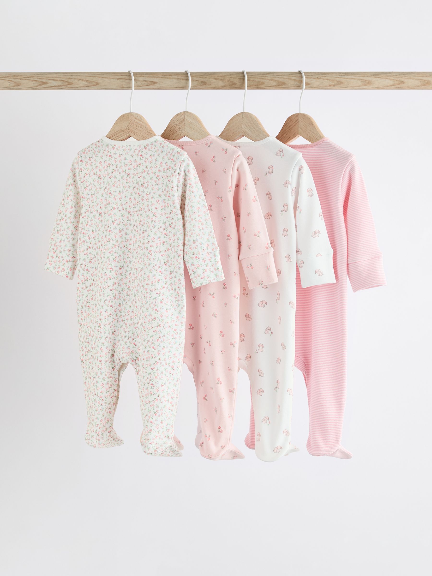 Buy Pink 4 Pack Baby Sleepsuits (0-2yrs) from Next Australia
