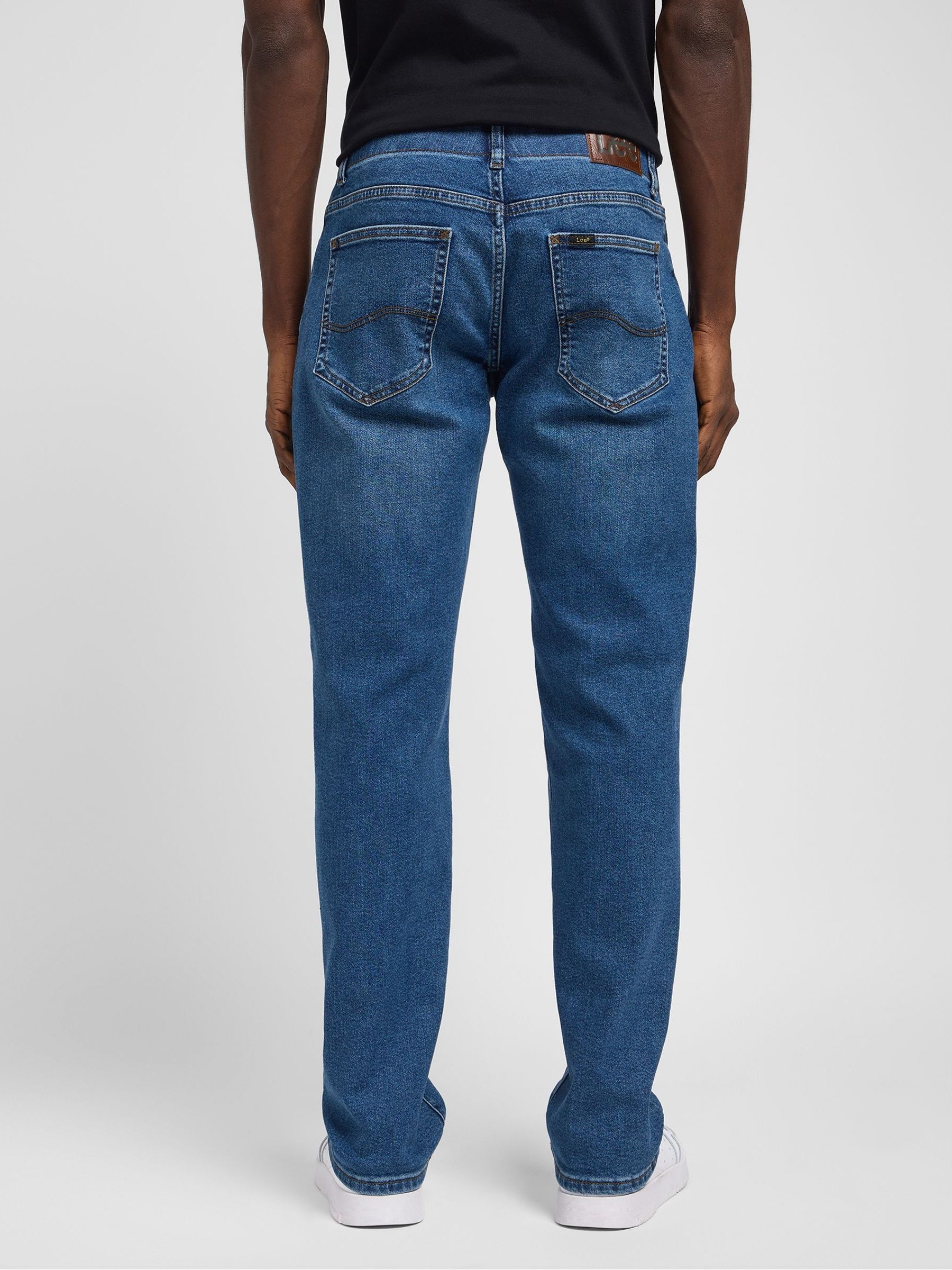 Buy Lee Mid Blue Denim Straight Fit Extreme Motion Jeans from the Next UK online shop