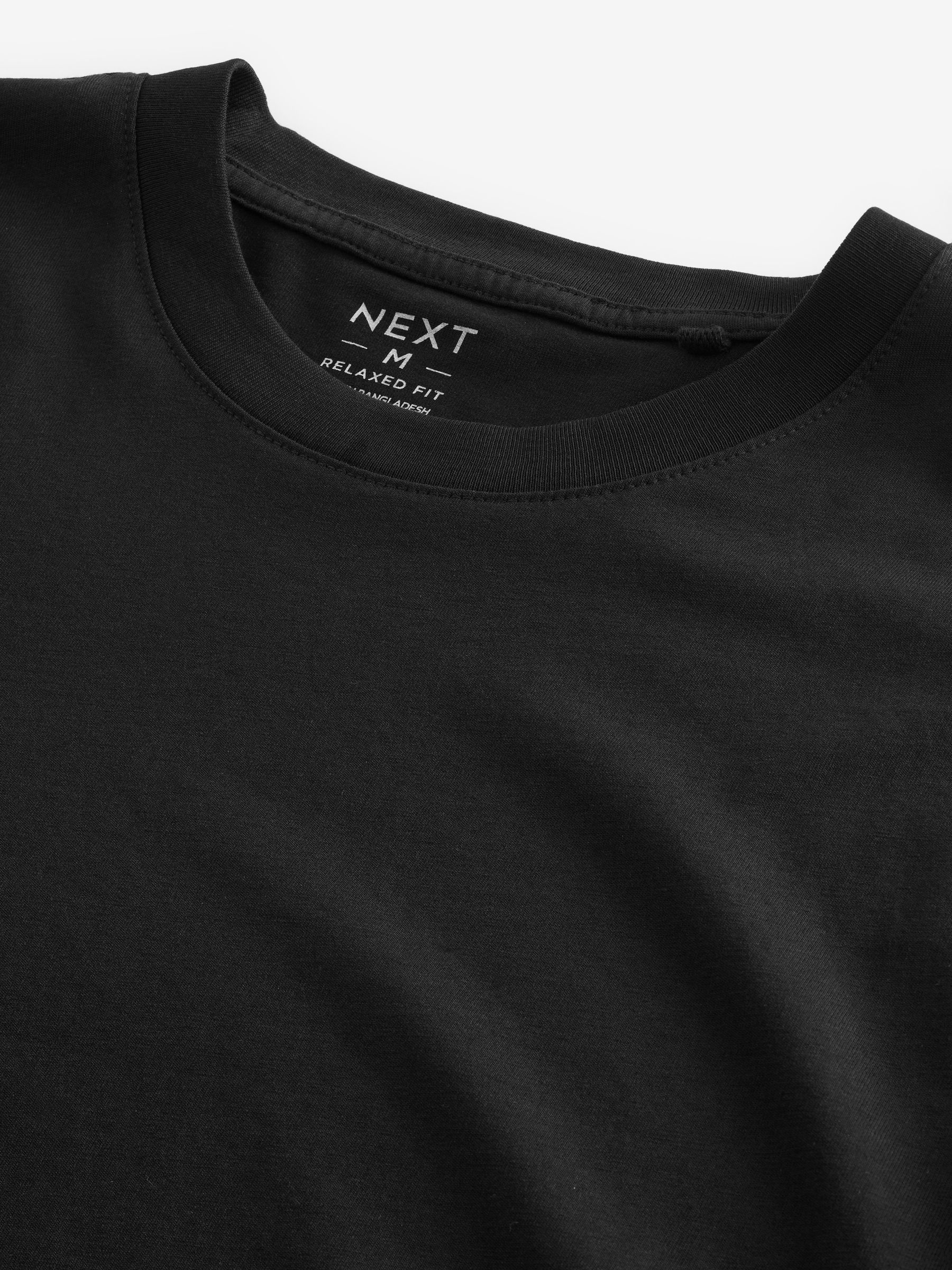 Buy Black - Essential Cotton T-Shirts Relaxed Fit 5 Pack from Next Germany