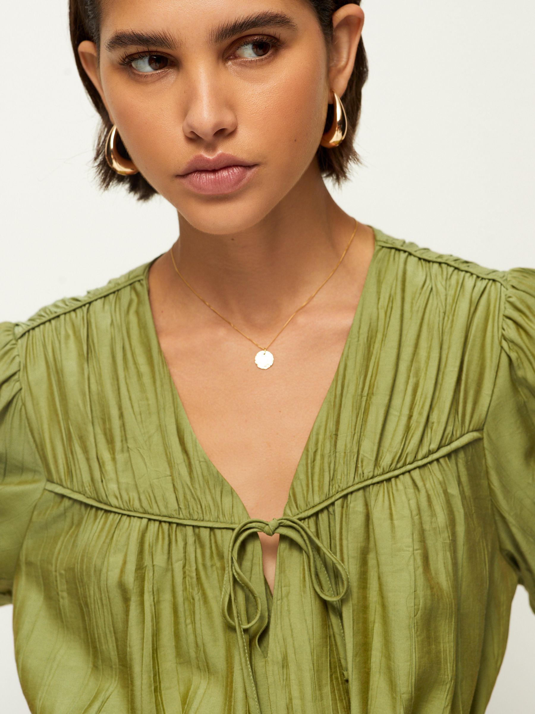 Buy Green Tie Front Tiered Textured Short Sleeve Blouse from Next Ireland