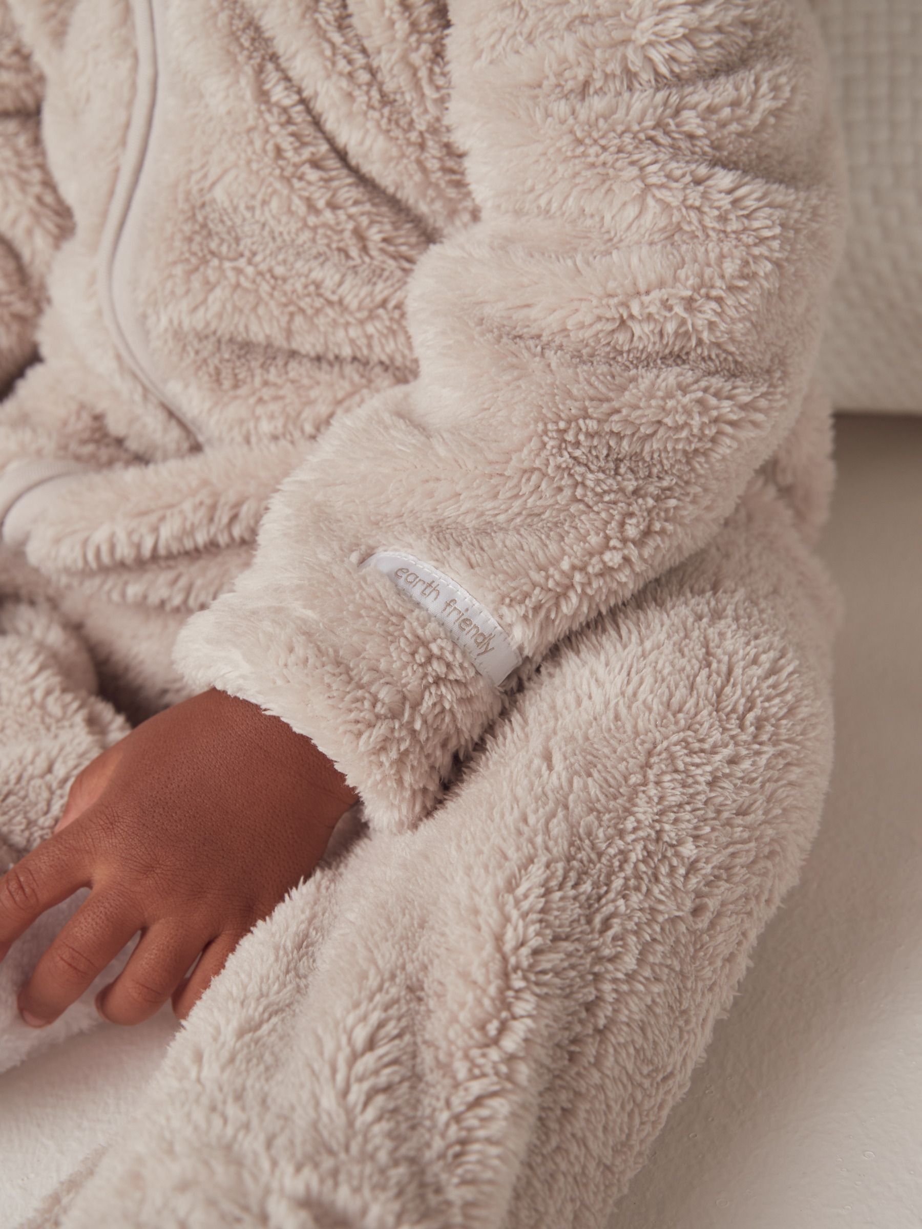 Buy The White Company Natural Pebble Fleece Romper from the Next UK ...