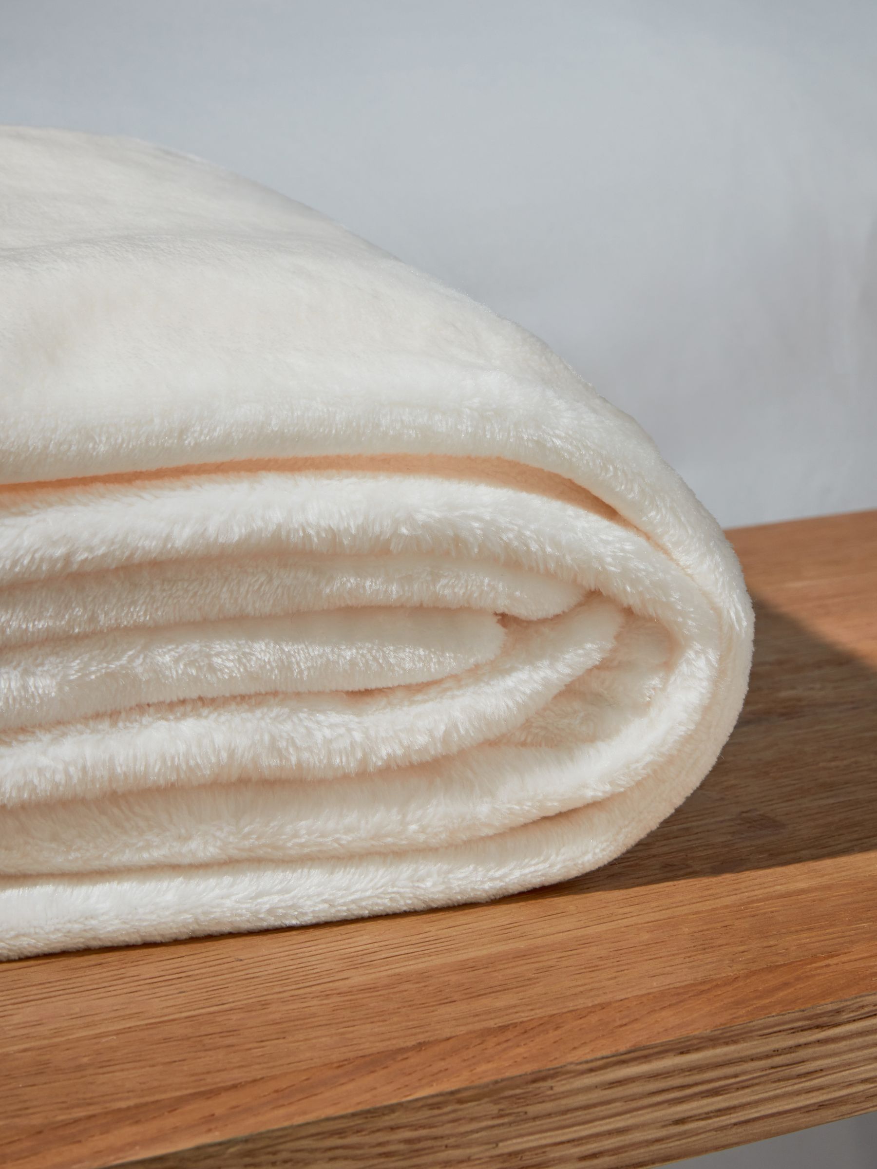 Buy Ivory Plush Fleece Throw from the Next UK online shop