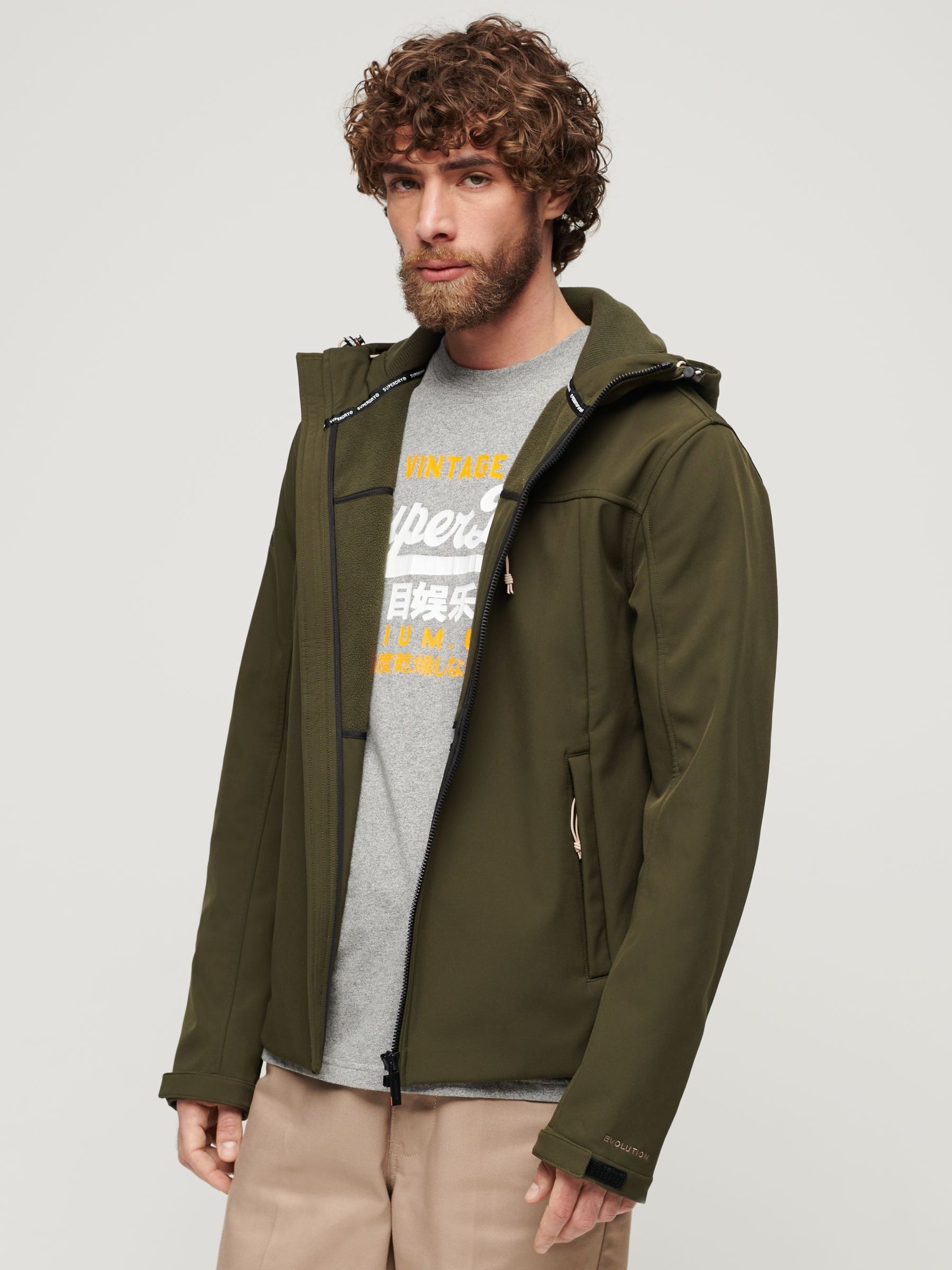 Buy Superdry Green Hooded Soft Shell Trekker Jacket from the Next UK ...