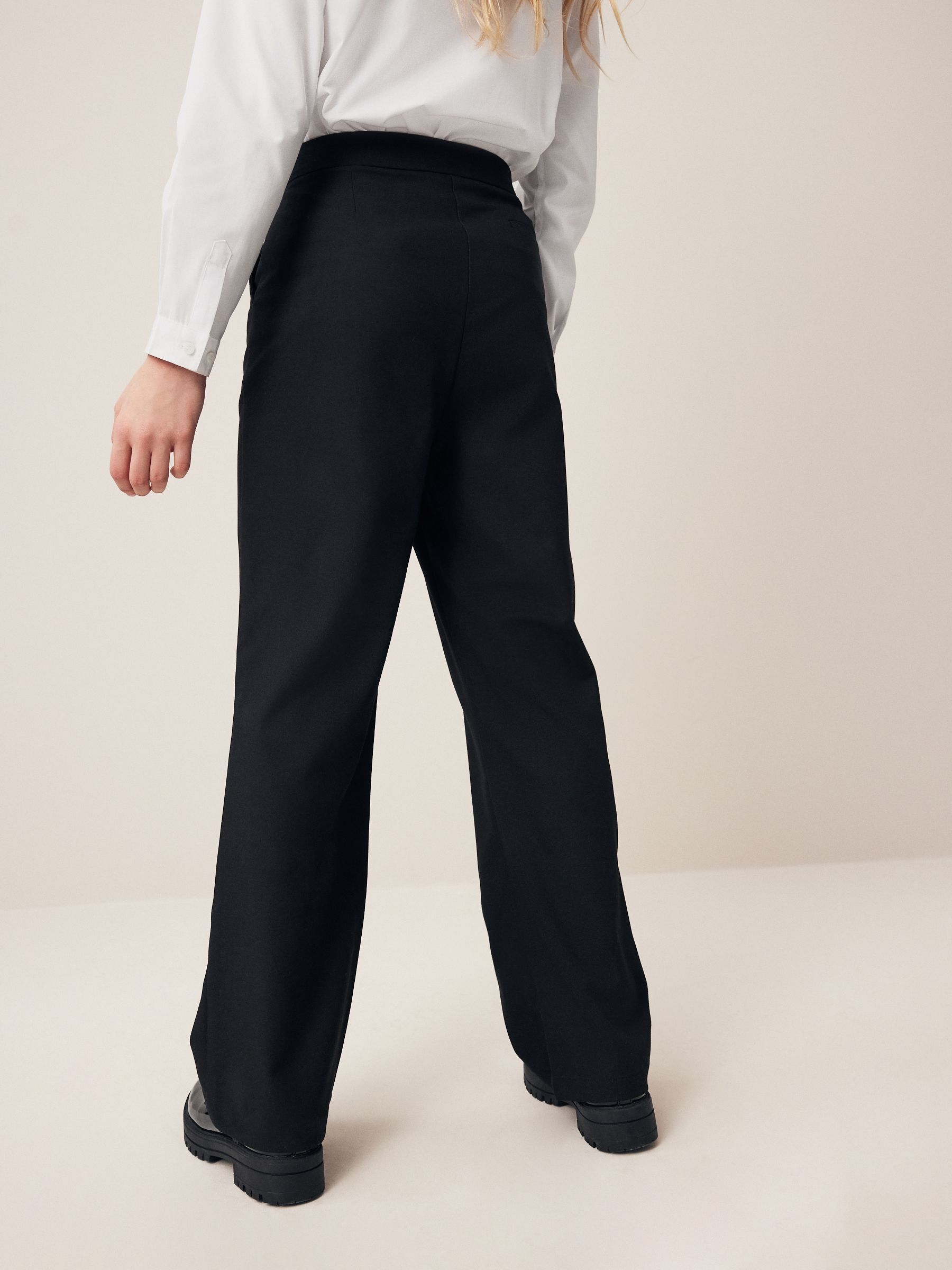 Buy Black Senior High Waist Flared School Trousers (9-17yrs) from the ...