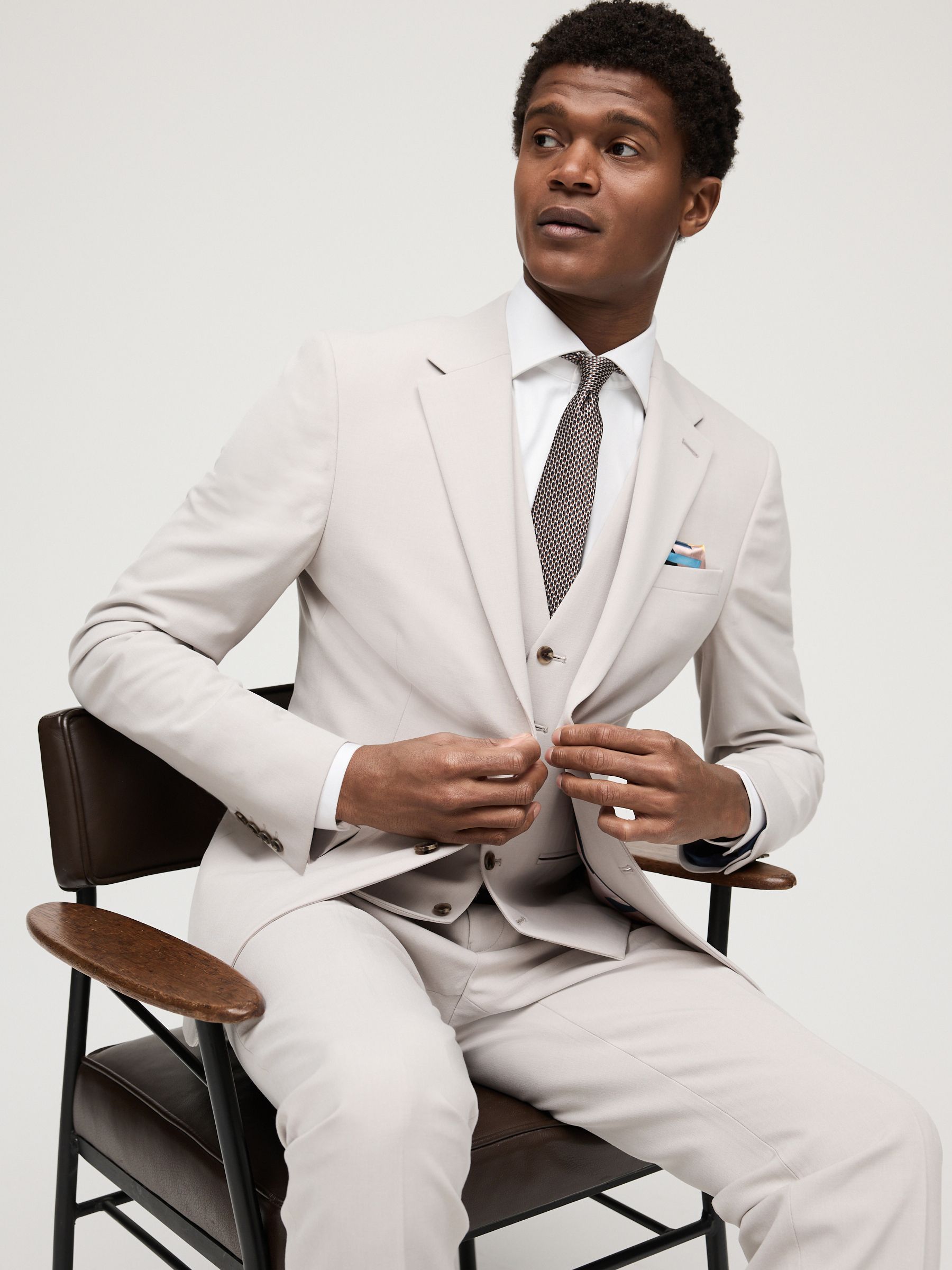 Buy Neutral Skinny Fit Motionflex Stretch Suit Jacket from the Next UK ...