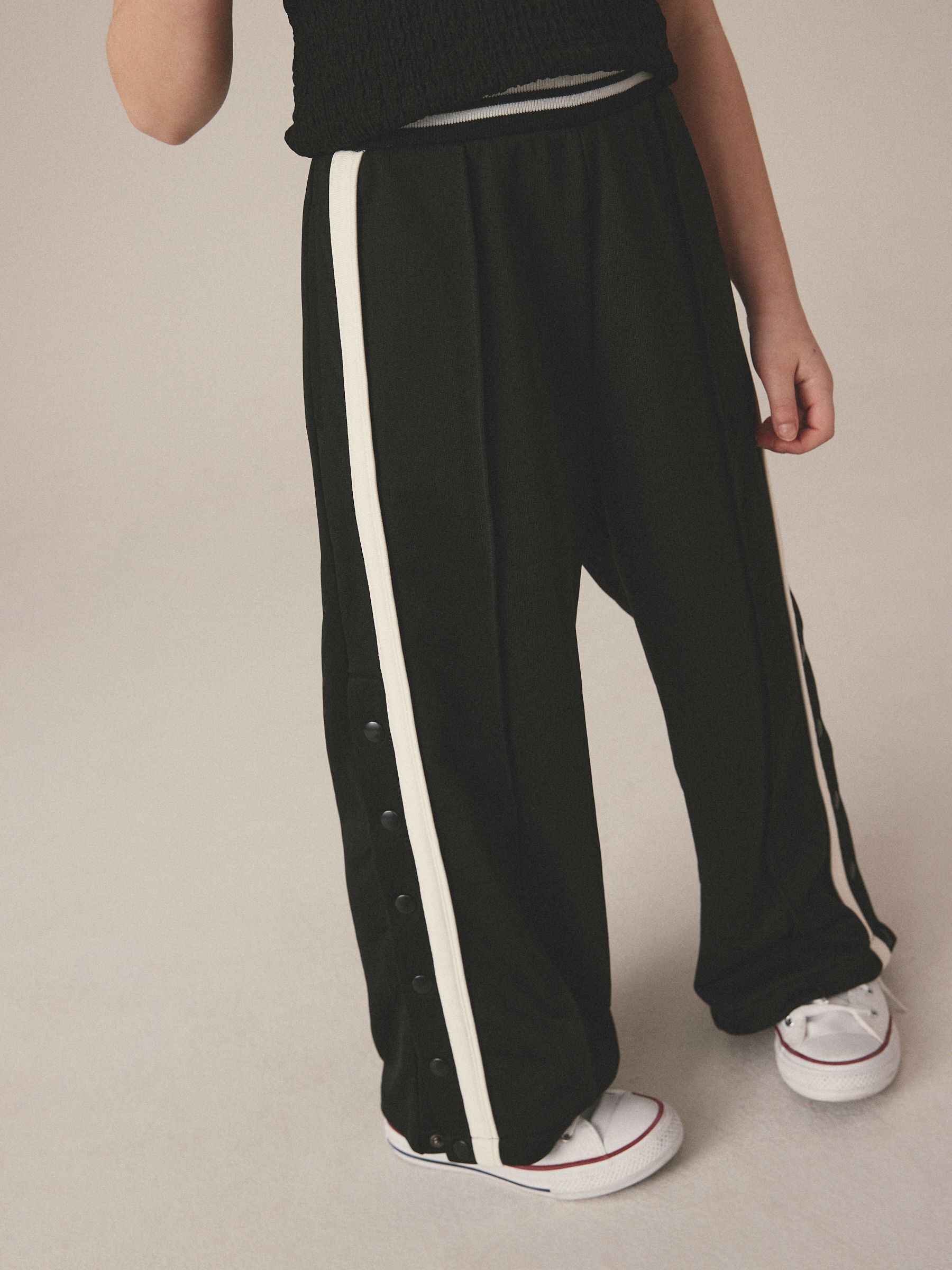 Buy Black Wide Leg Popper Joggers (3-16yrs) from the Next UK online shop
