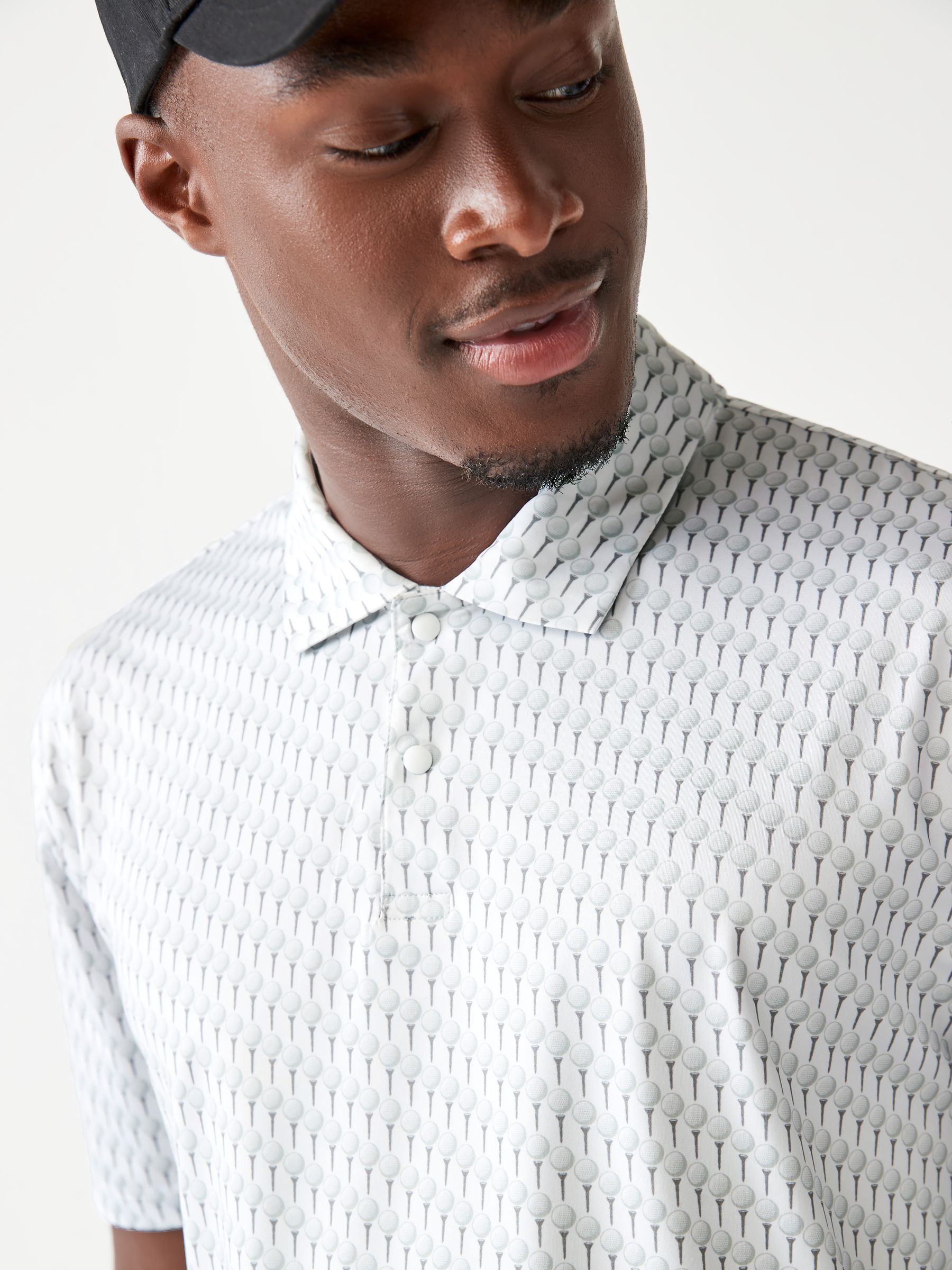 Buy White Active Print Golf Polo Shirt from the Next UK online shop