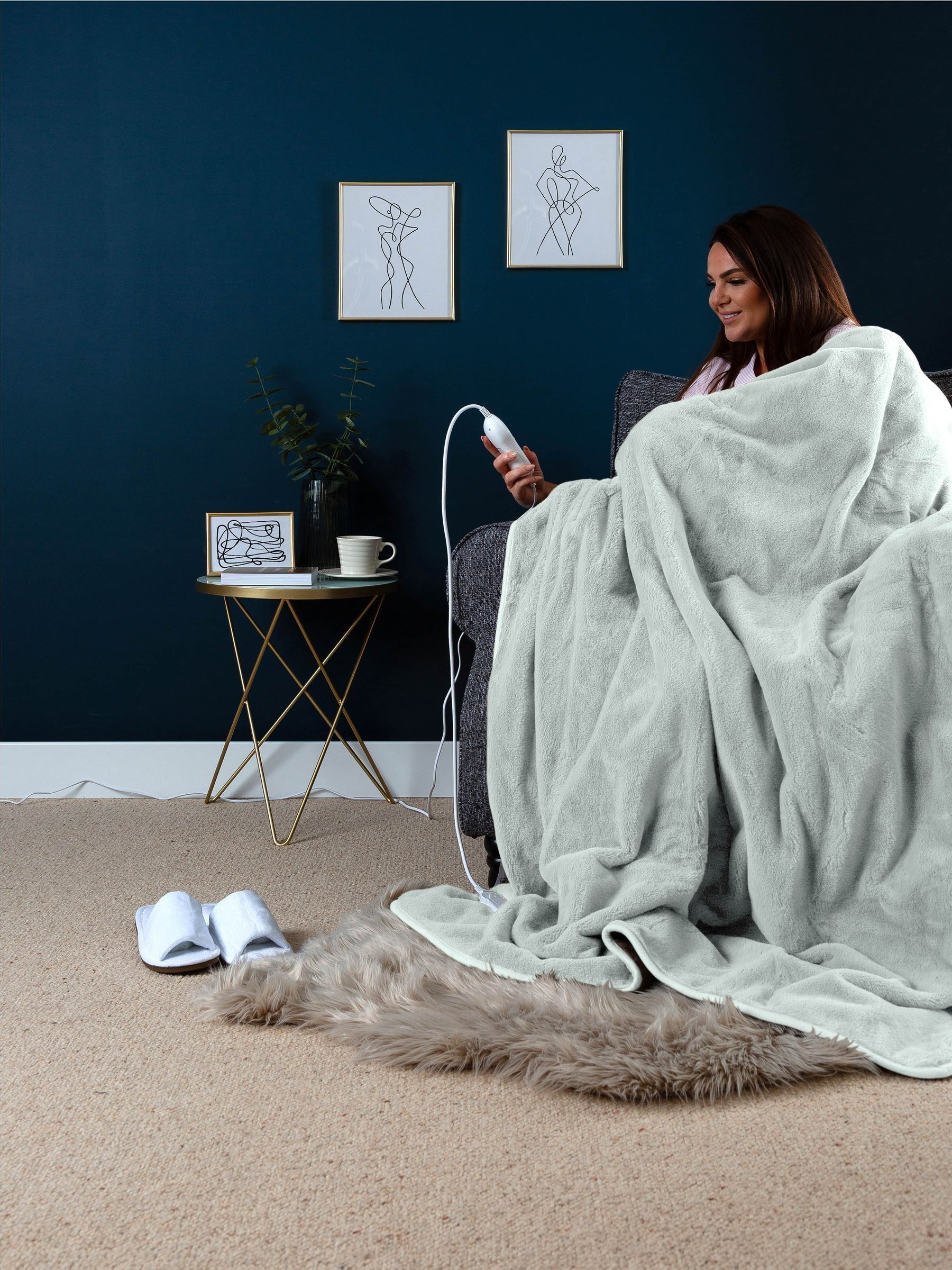 Buy Slumberdown Green Elegantly Warm Luxury Heated Throw from the Next ...