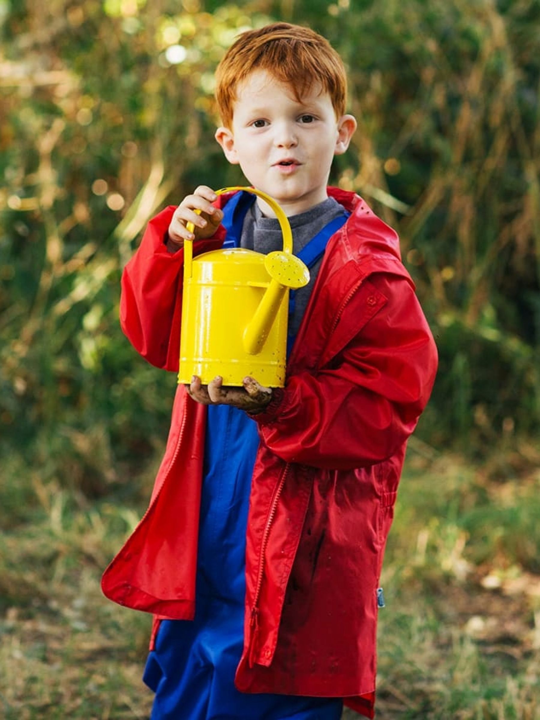 Buy Muddy Puddles Red Originals Waterproof Jacket from the Next UK ...