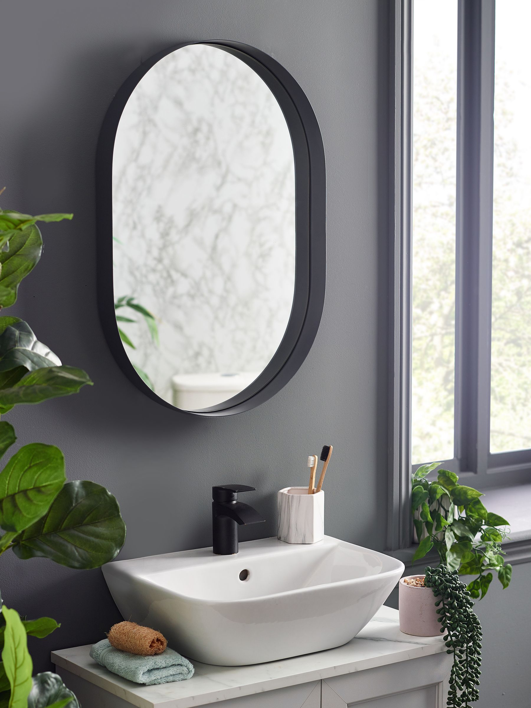 Buy Black Oval 65x45cm Wall Mirror from the Next UK online shop