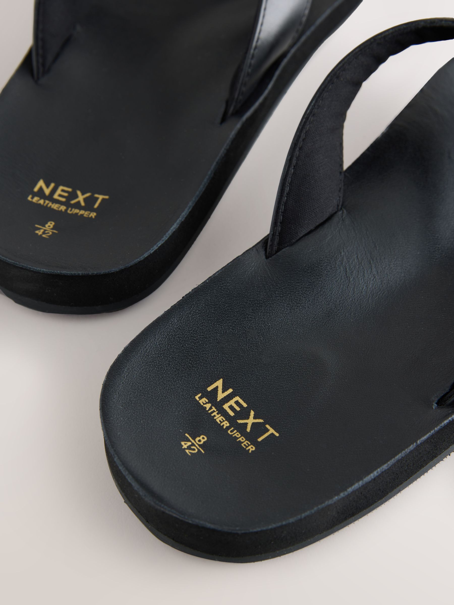Buy Black Leather Flip Flops from the Next UK online shop