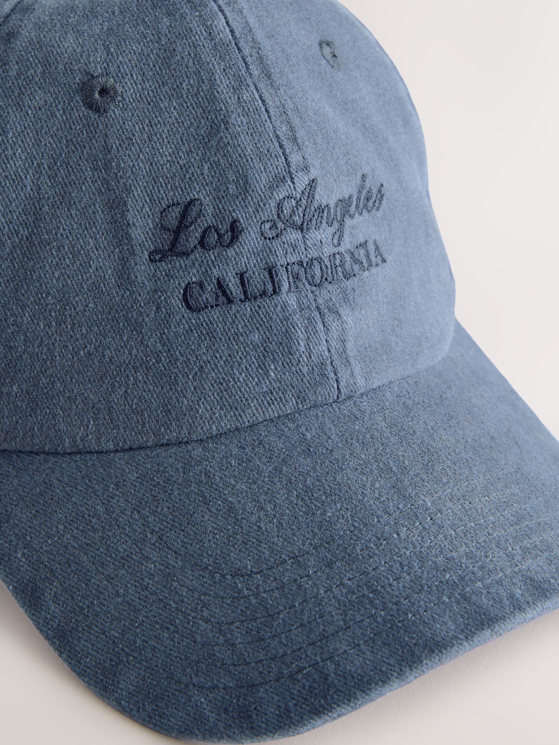 Buy Denim Blue Cotton Twill Slogan Cap from the Next UK online shop