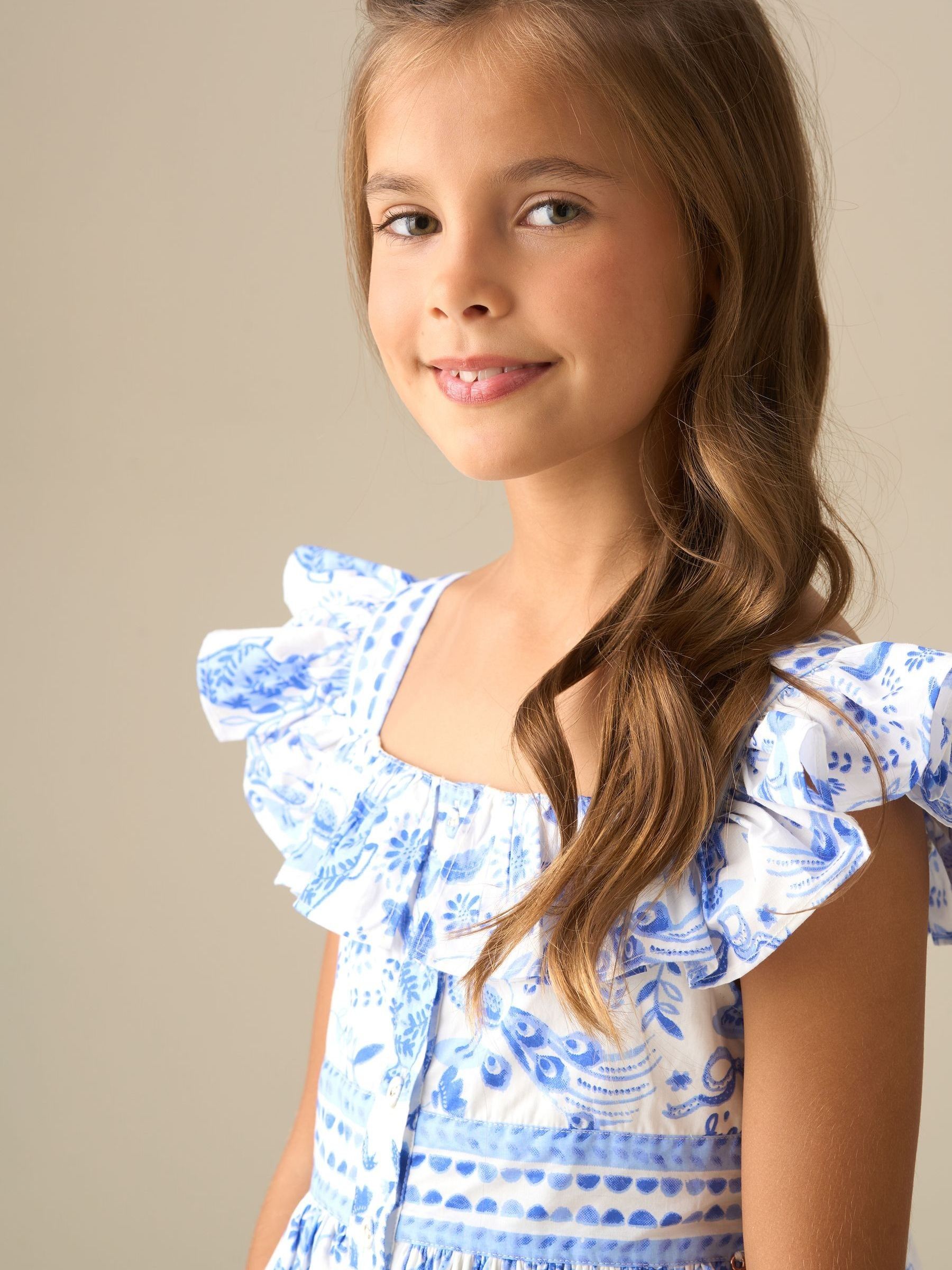 Buy Angel & Rocket Blue Ellery Print Ruffle Sleeve Dress from Next ...