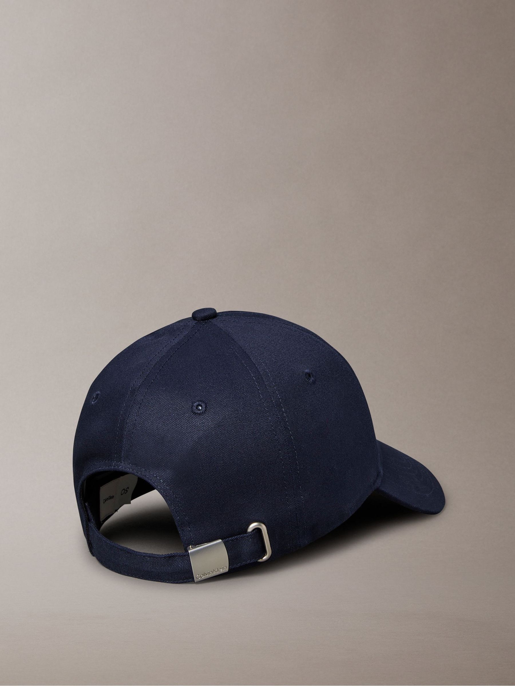 Buy Calvin Klein Blue Monogram Shine Embroidery Moire Cap from the Next ...