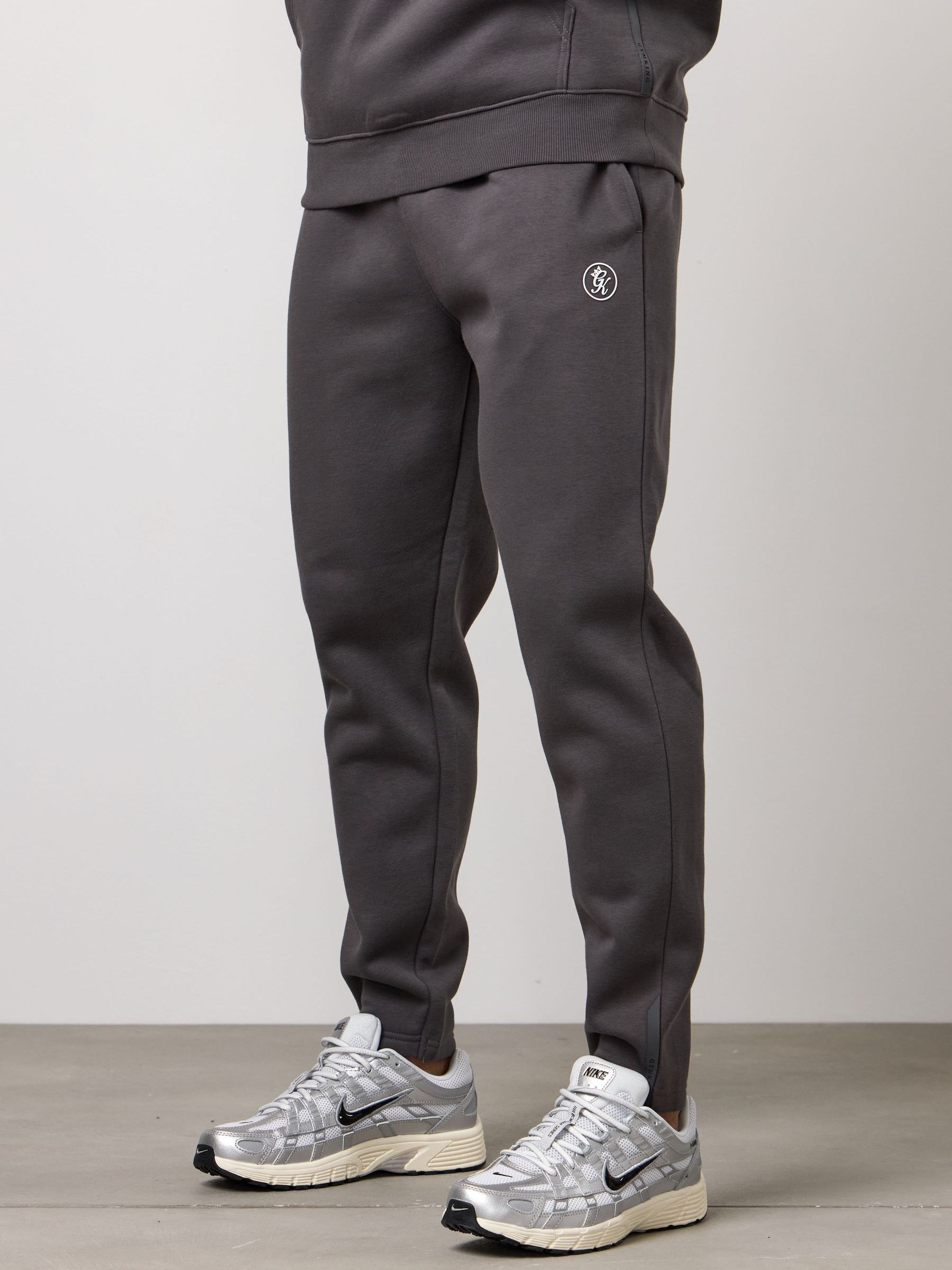 Buy Grey - Gym King Pro Logo Joggers from Next Portugal